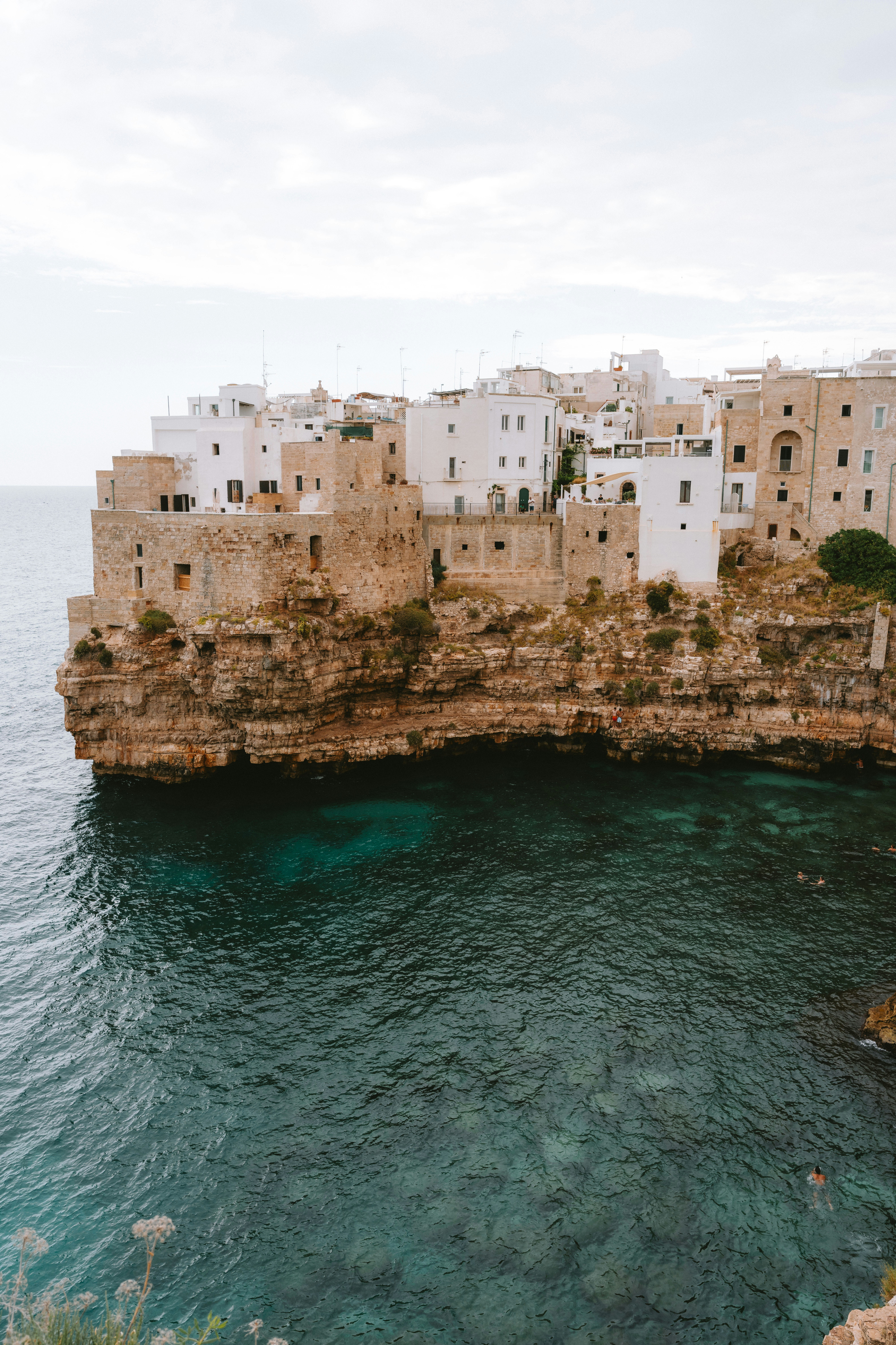 Cliffside Whitewashed Town Over Turquoise Seas