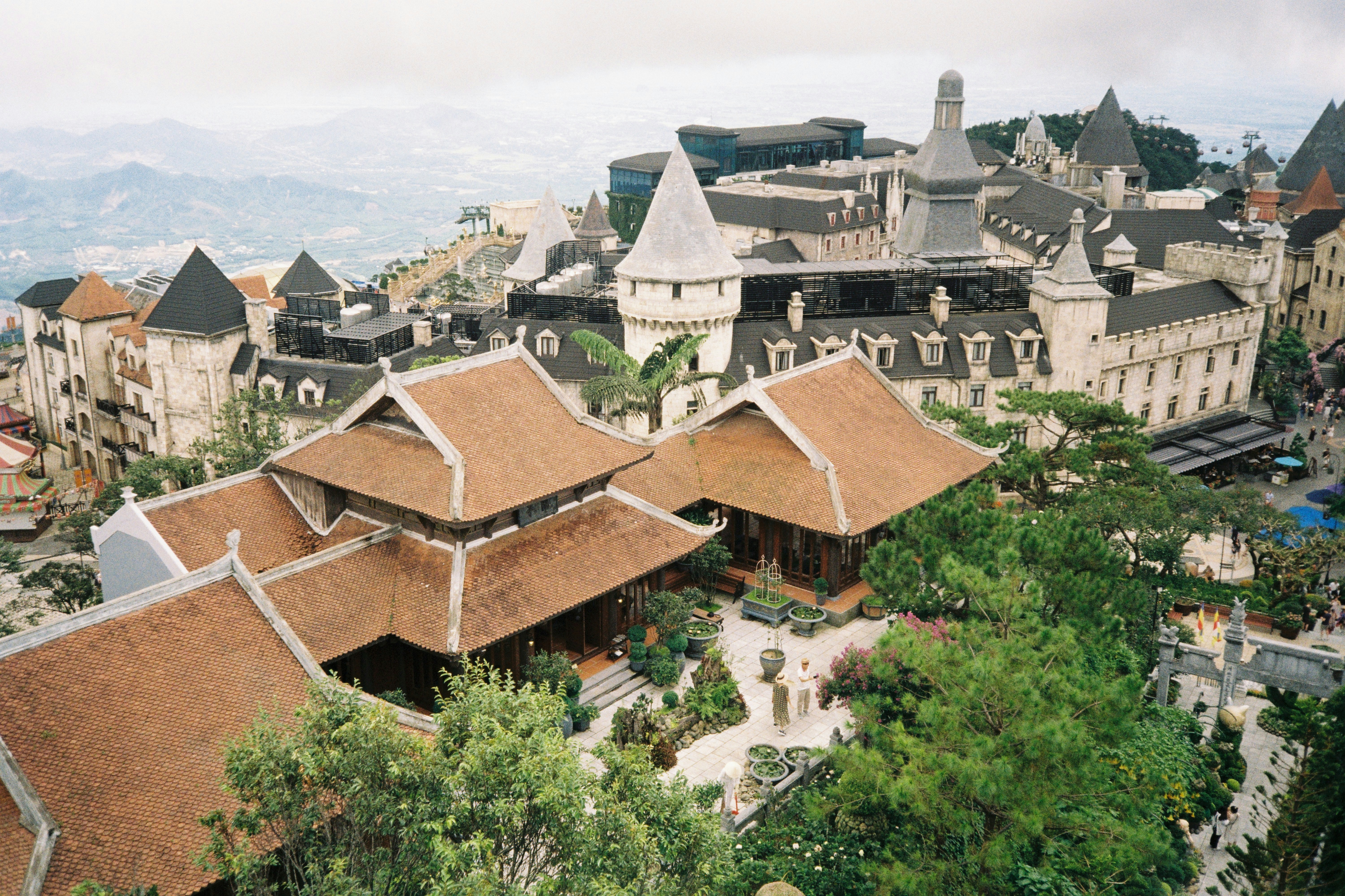 Stone Keep Overlook: A Rooftop View Across a Medieval Fortress Market