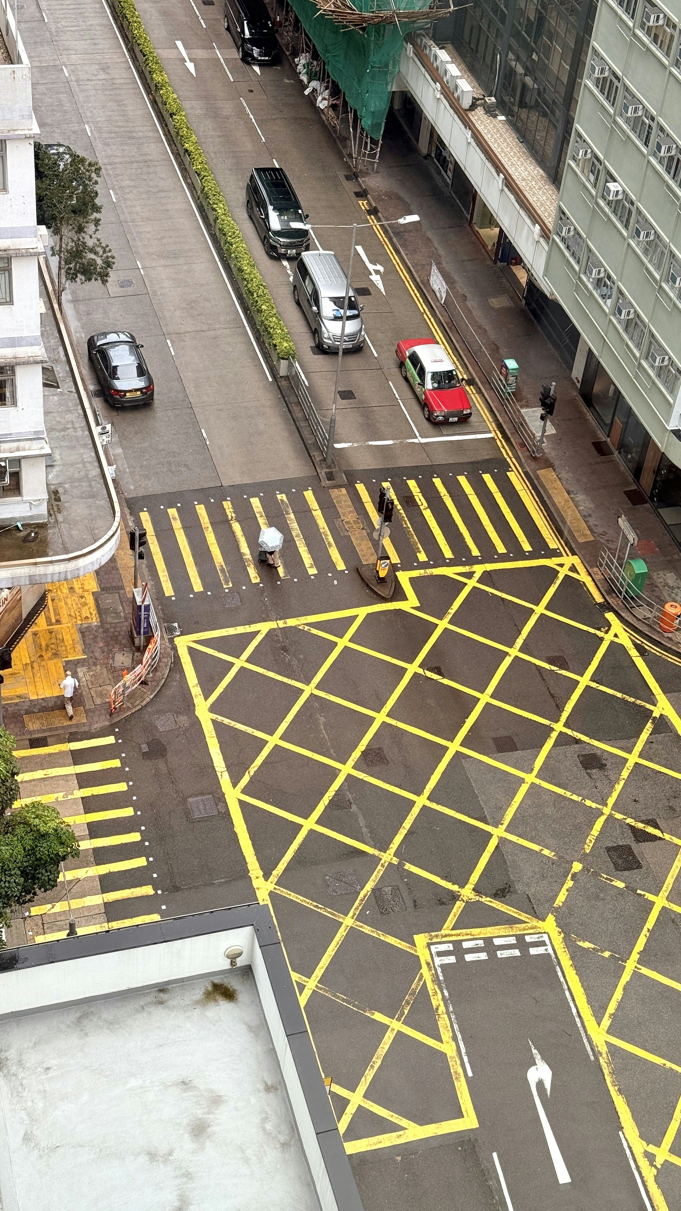 Aerial Crossroads: City Street Painted in Bright Grid