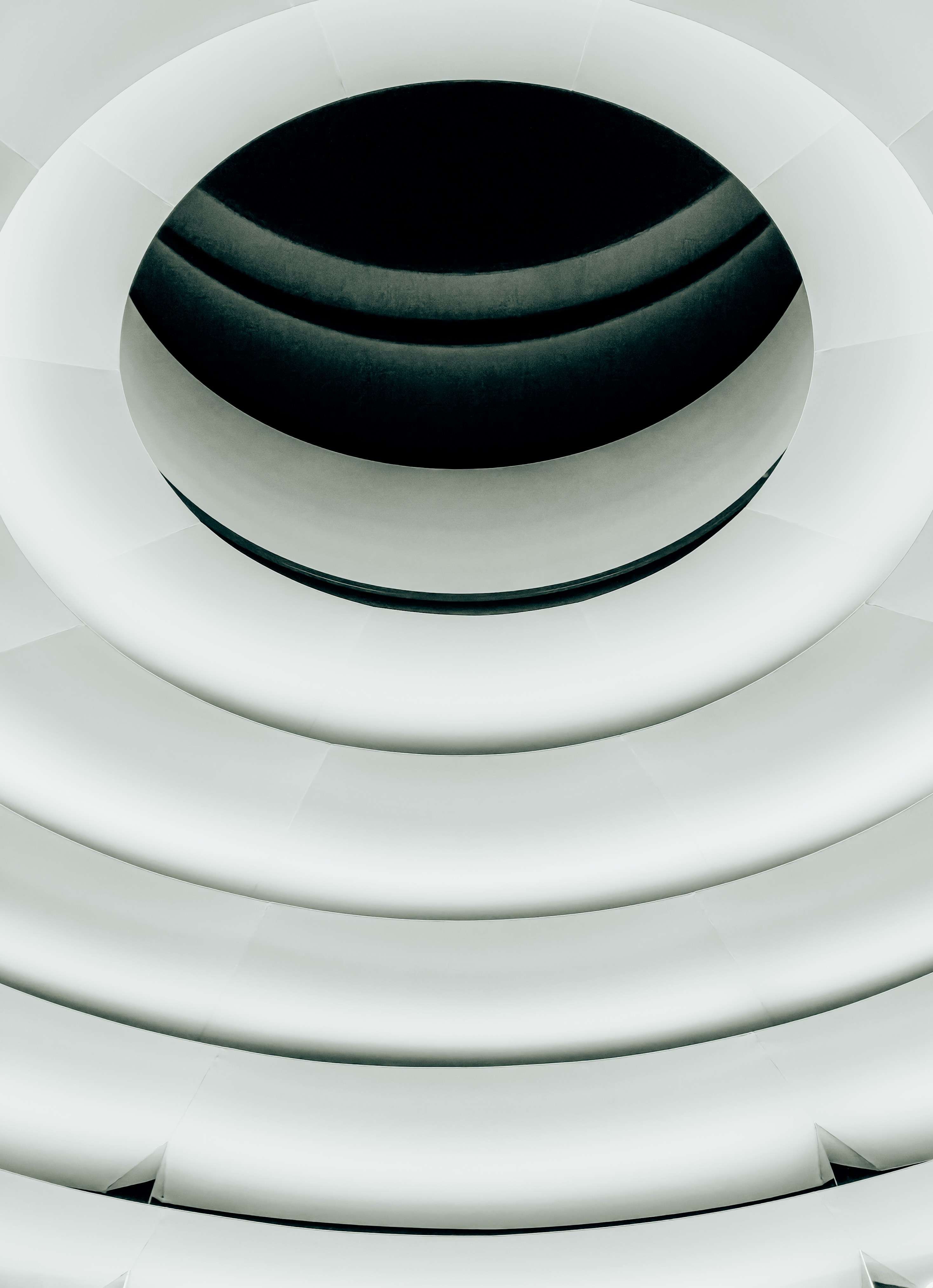 Concentric Neon Tunnels: A Study in Repetition and Light
