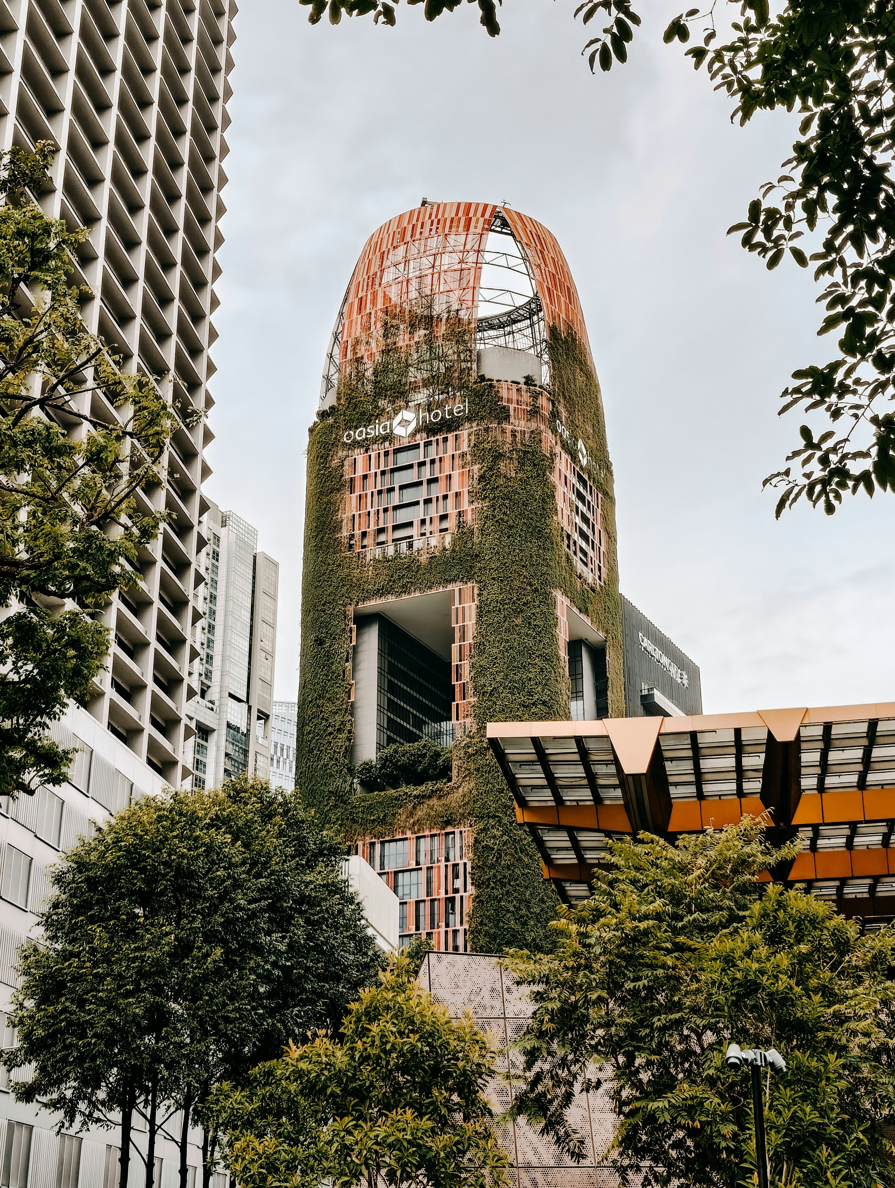 Vertical Gardened Tower Rising Above City Grounds