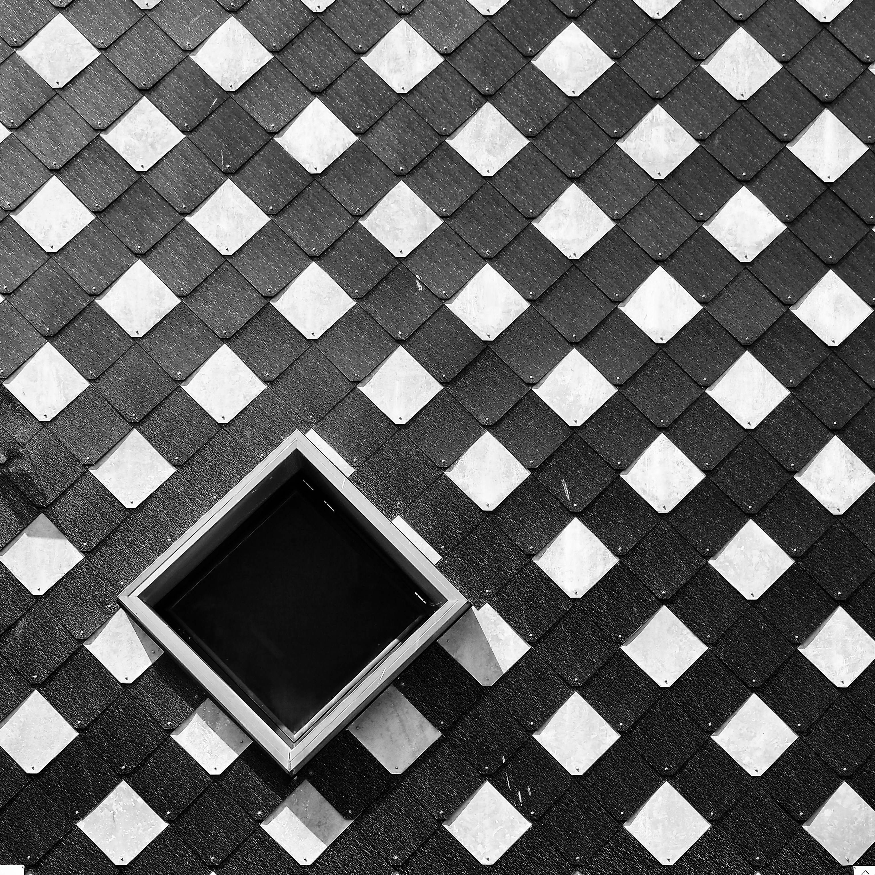 Geometric Roof Weave: A Square Hatch Surrounded by Diamond Tiles