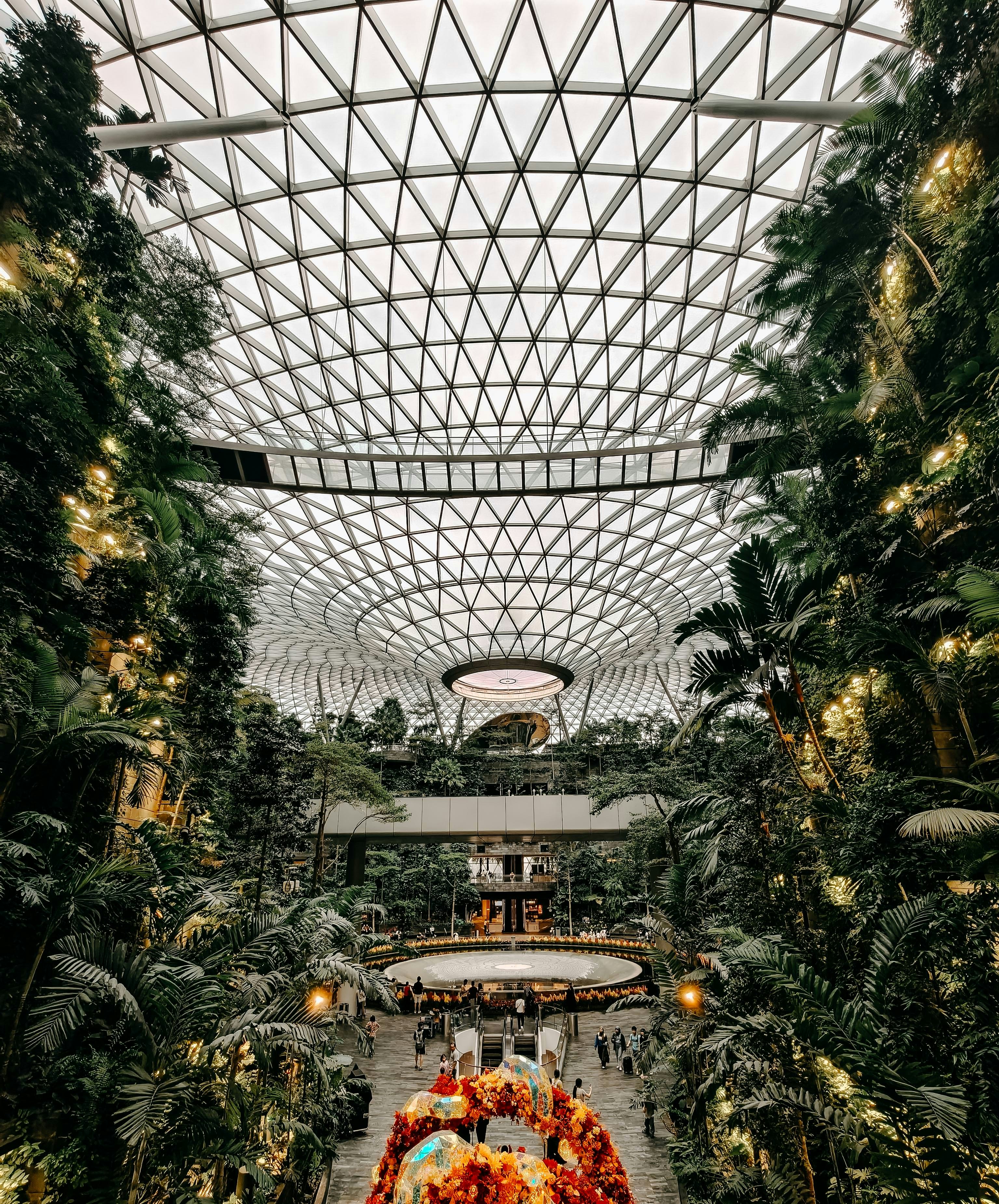 Glass Cathedral of Greenery: A Luminous Atrium Atrium