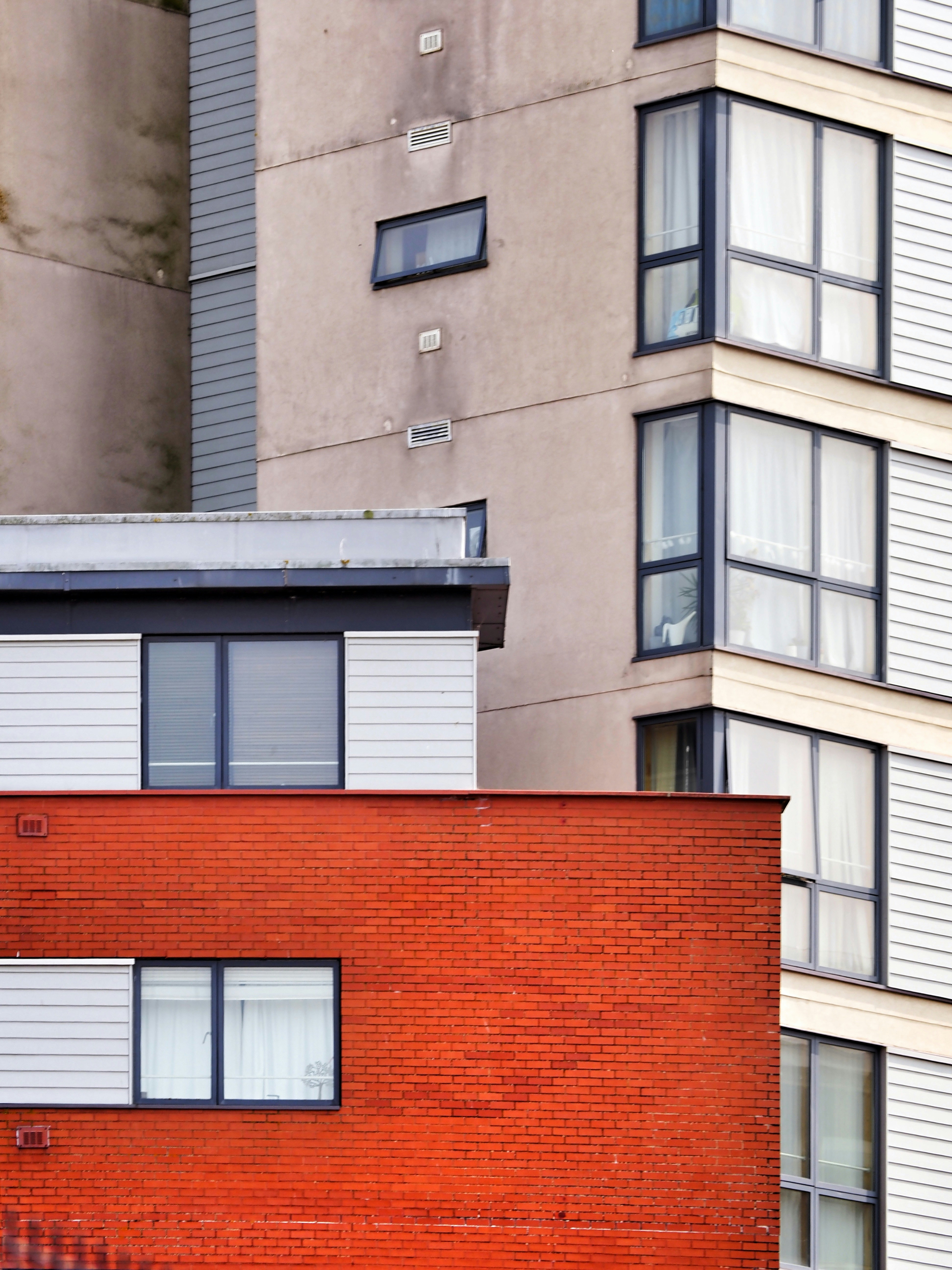 Brick and Glass Geometry: A City Facade's Quiet Layers