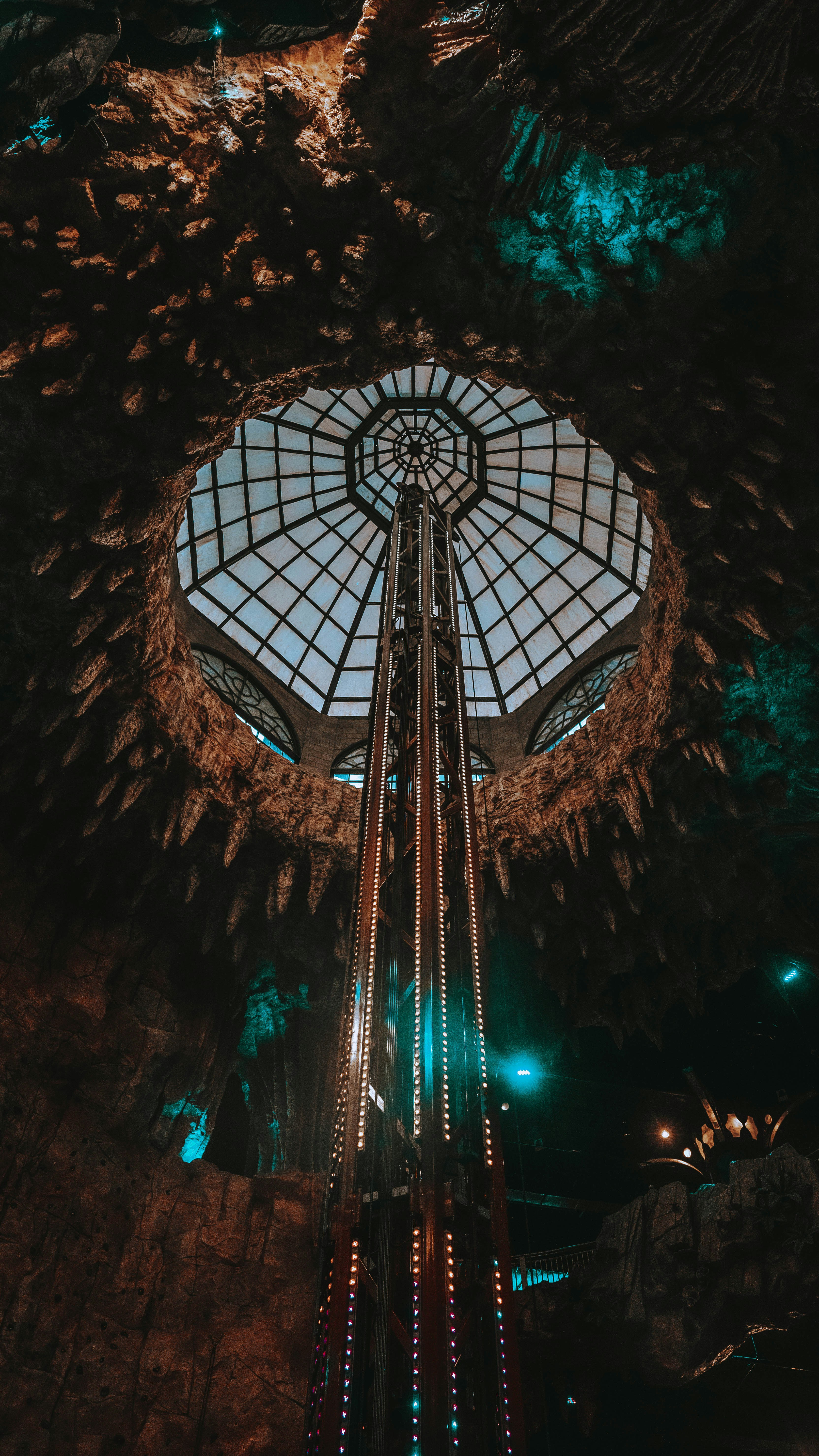 Centrifugal Lanterns: A Glass-Domed Descent into Illumined Cavern