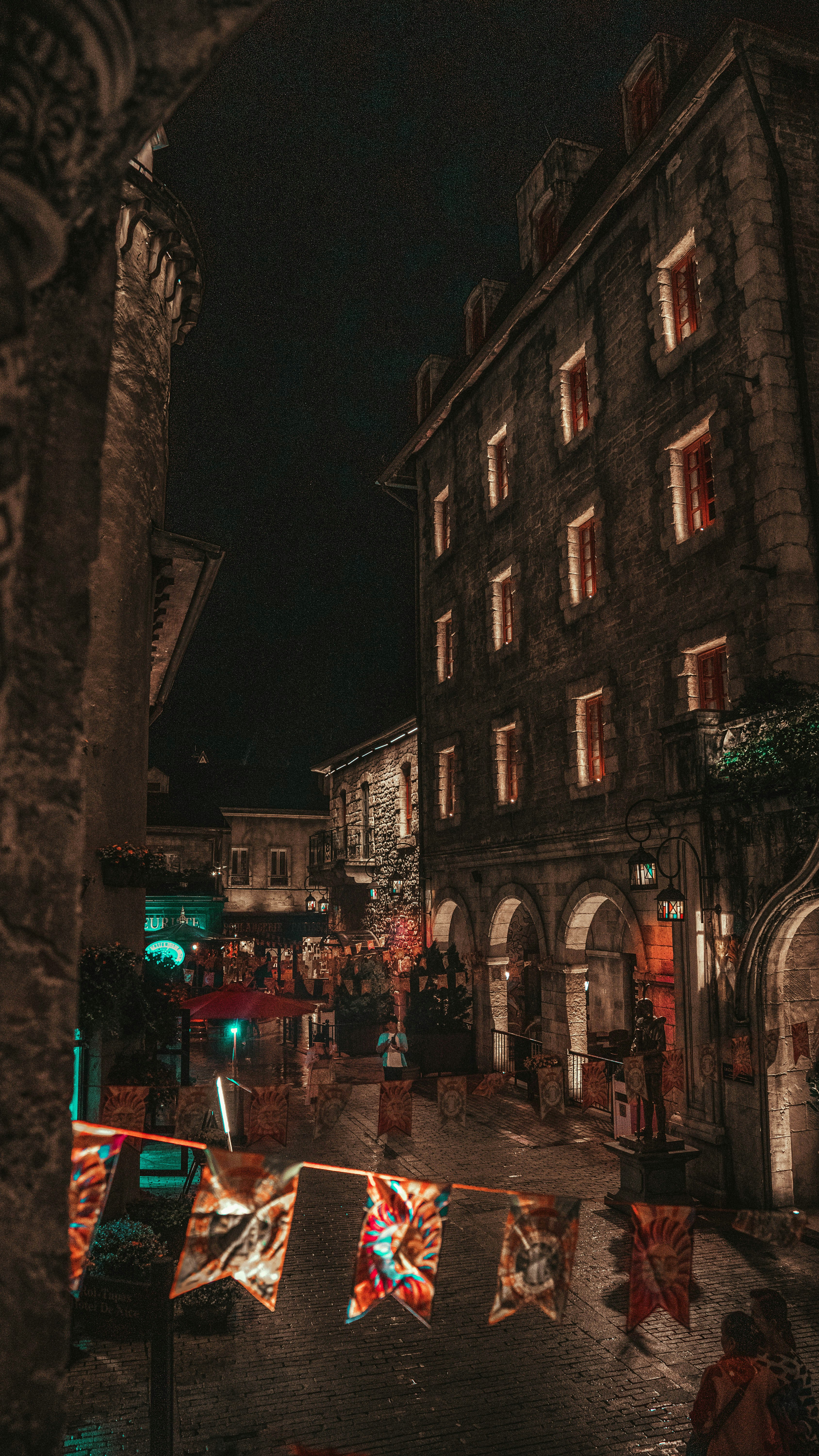 Moonlit Flags Over a Stony Street