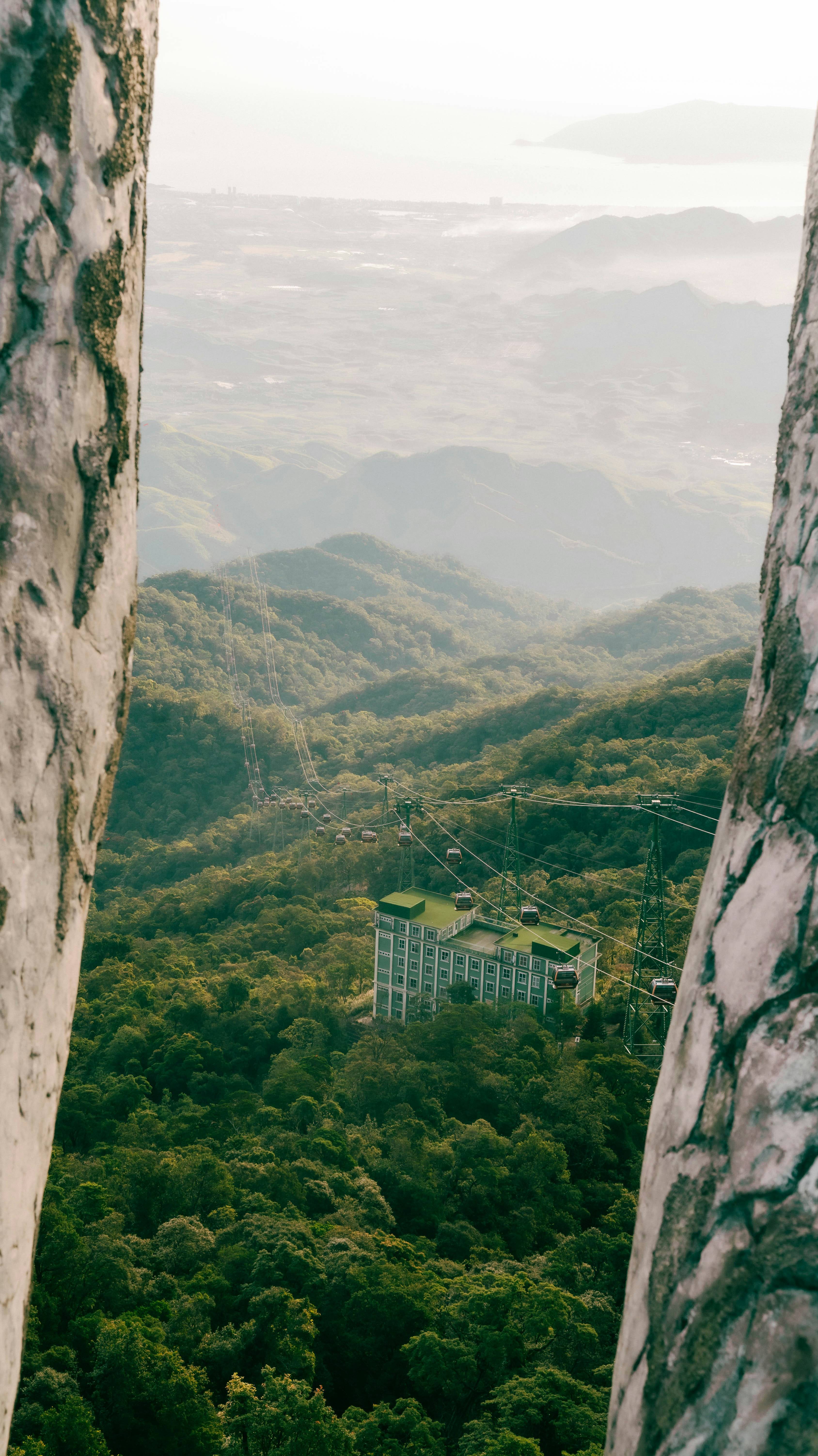 Cliffside Cable Car Amid Verdant Valleys