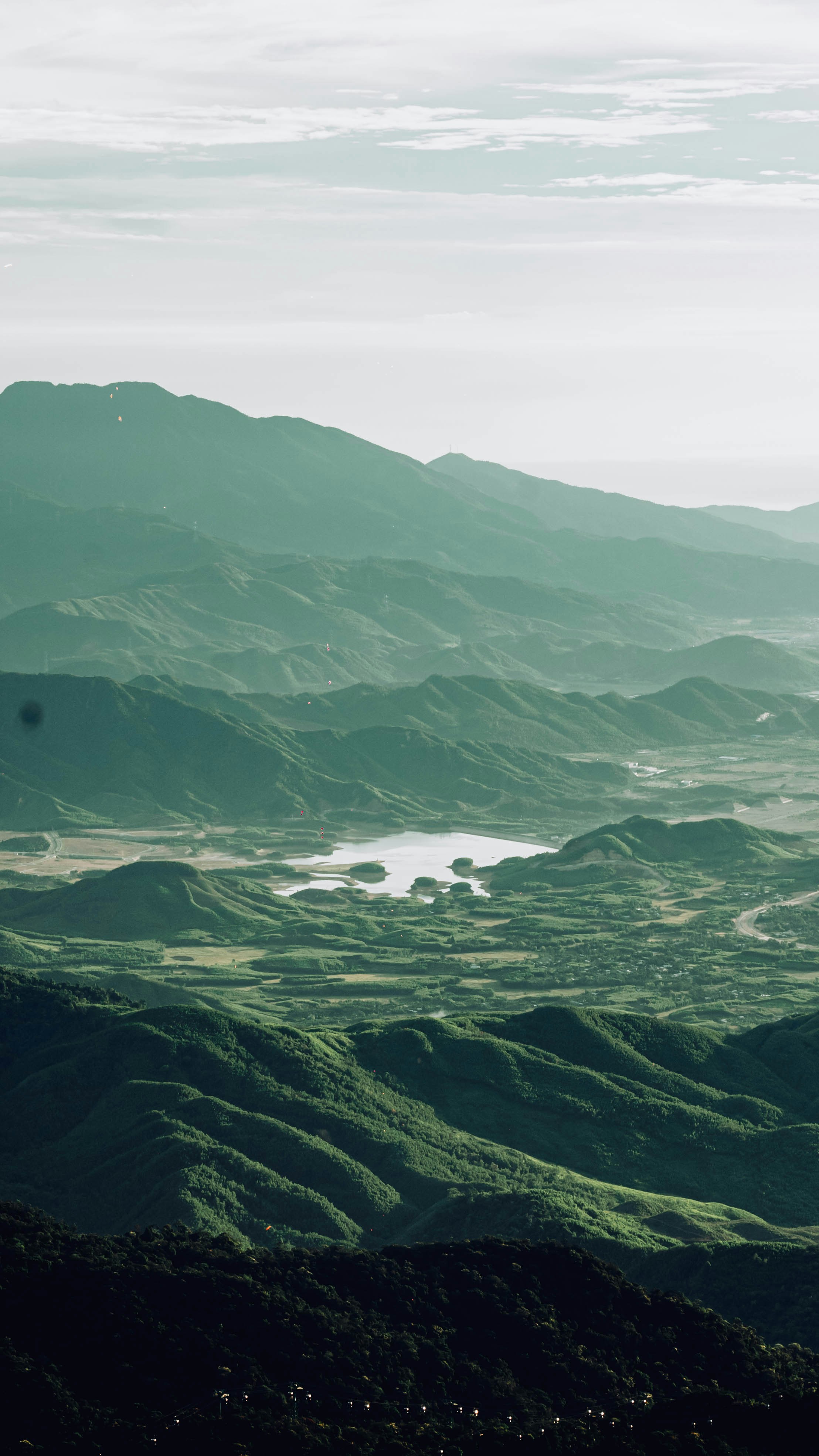 Emerald Valleys: A Dawn over Rolling Hills