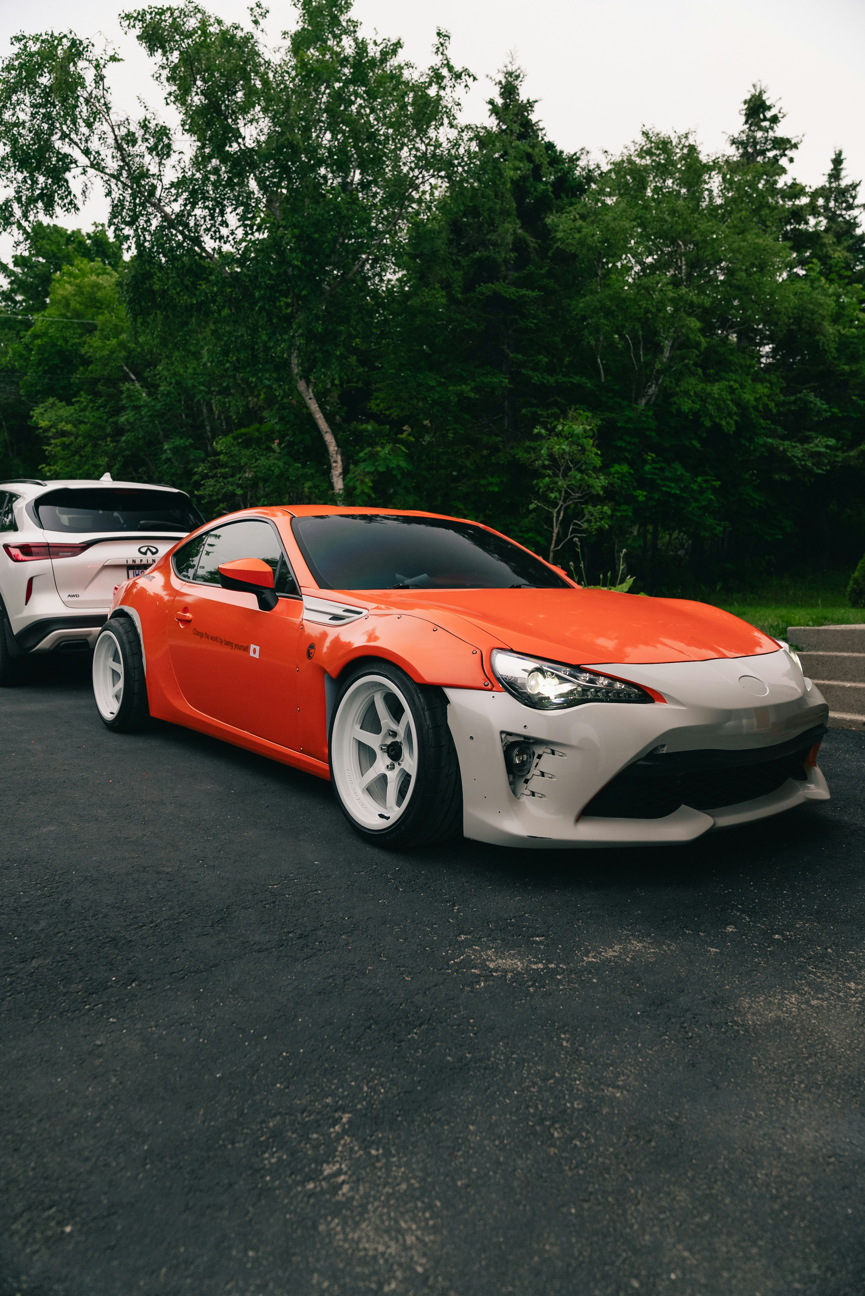 Bright Orange Street Racer with Wide White Flares