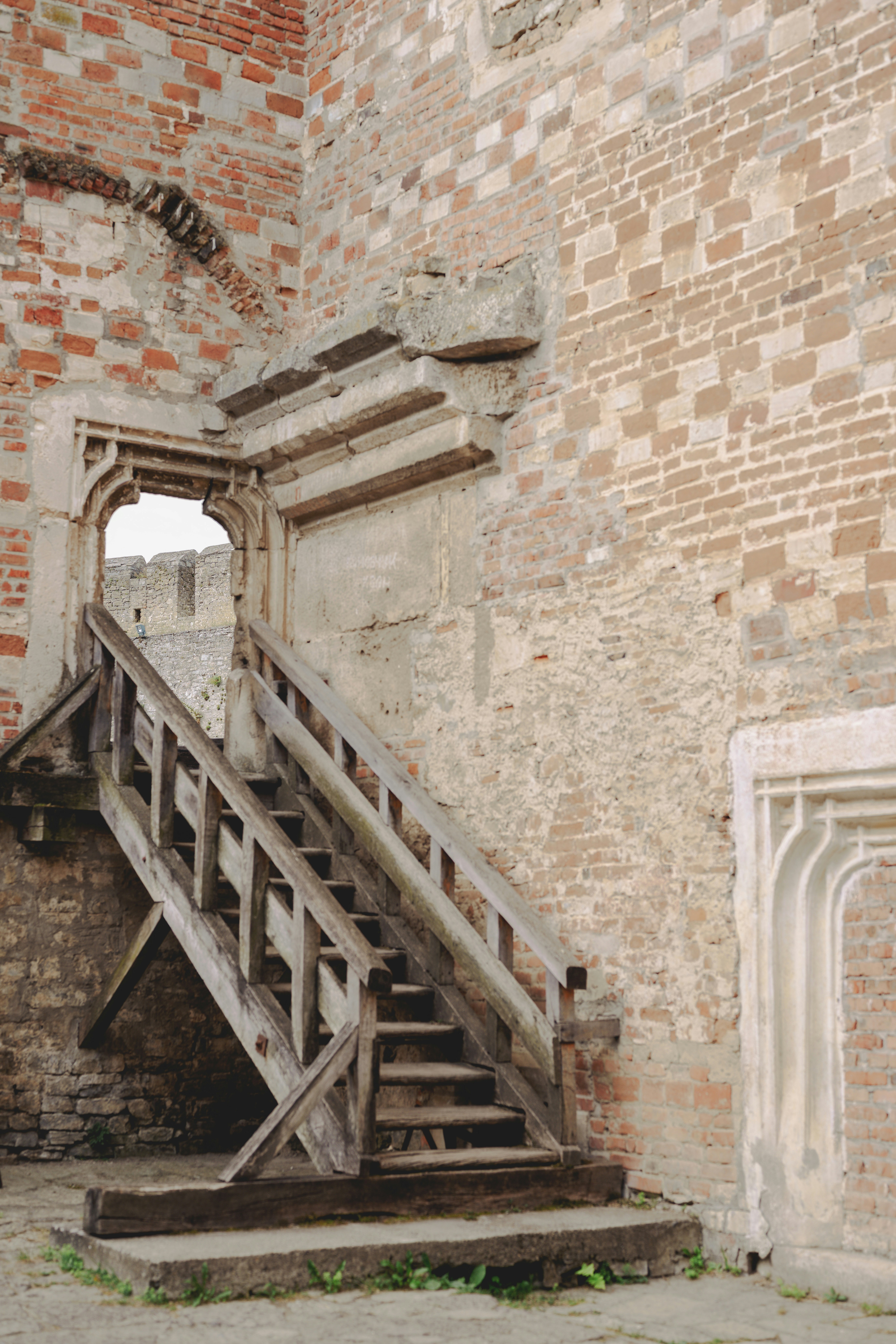 Weathered Staircase to a Arched Portal in a Brick Ruin