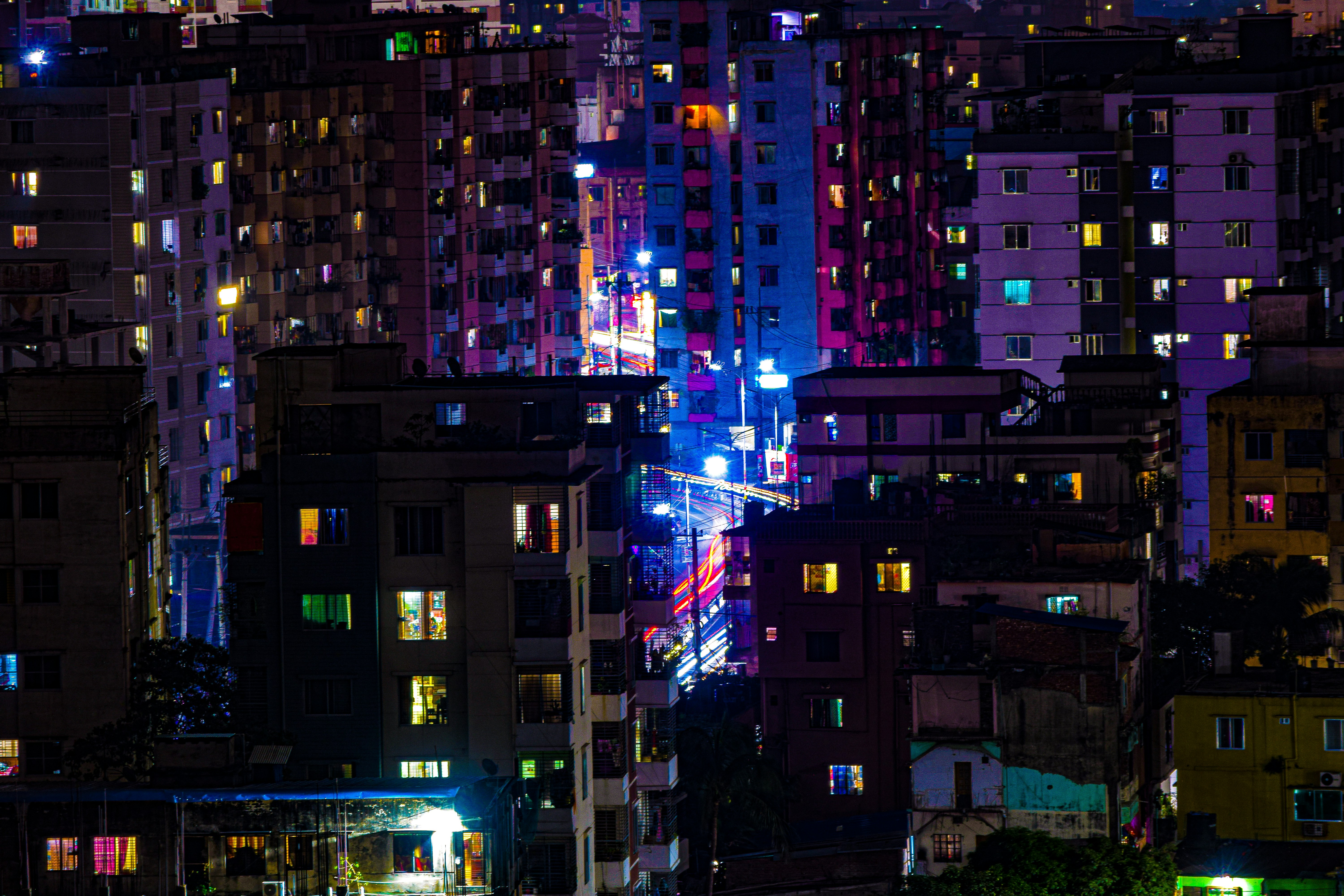 Night Corridor: Neon Arteries Between Distant Towers