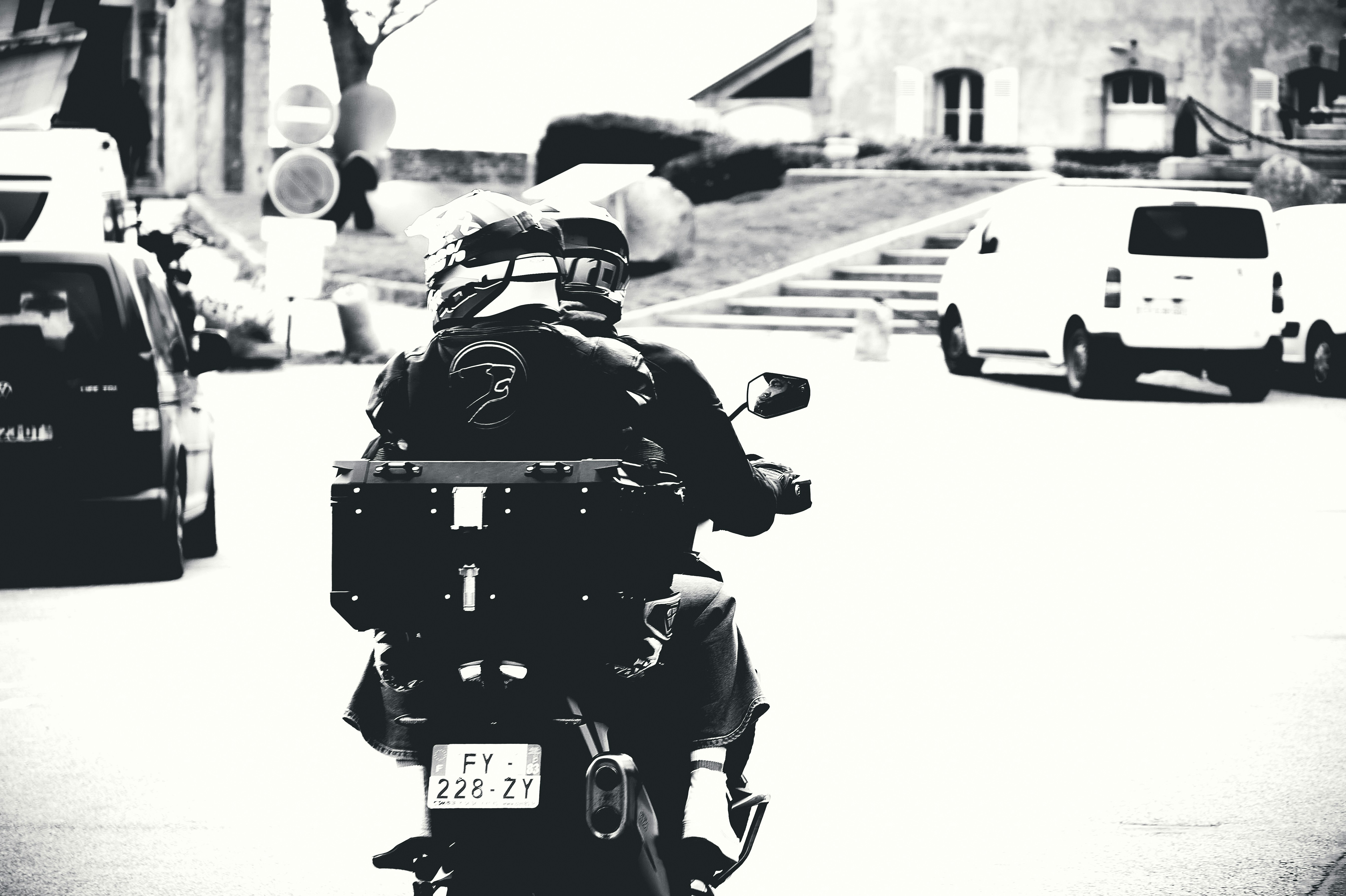 Rear Rider in High-Contrast Street Scene