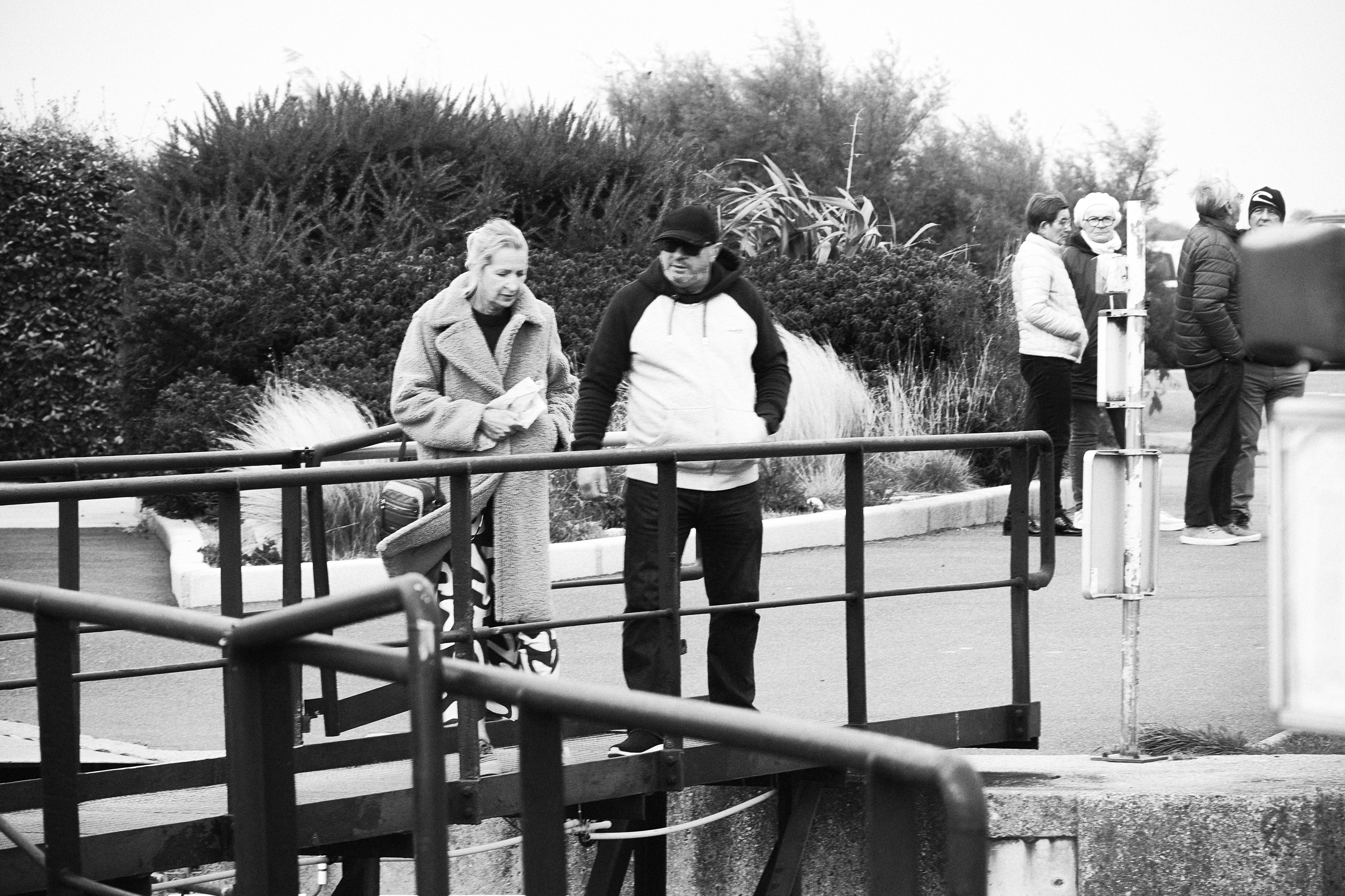 Quiet Moment on the Waterfront: Strangers in Conversation