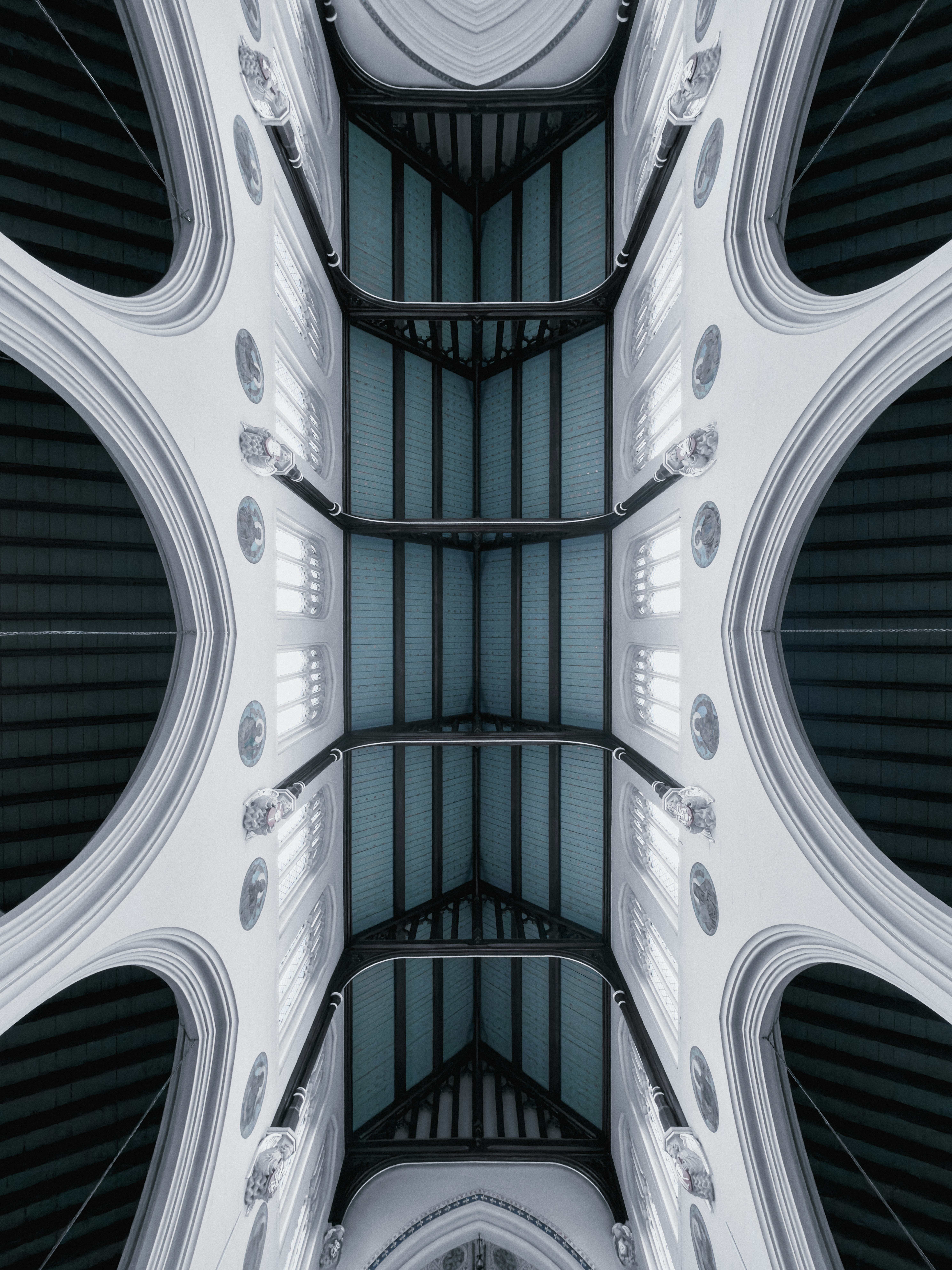 Architectural Symmetry: The Vaulted Vista of a Ceiling Gallery