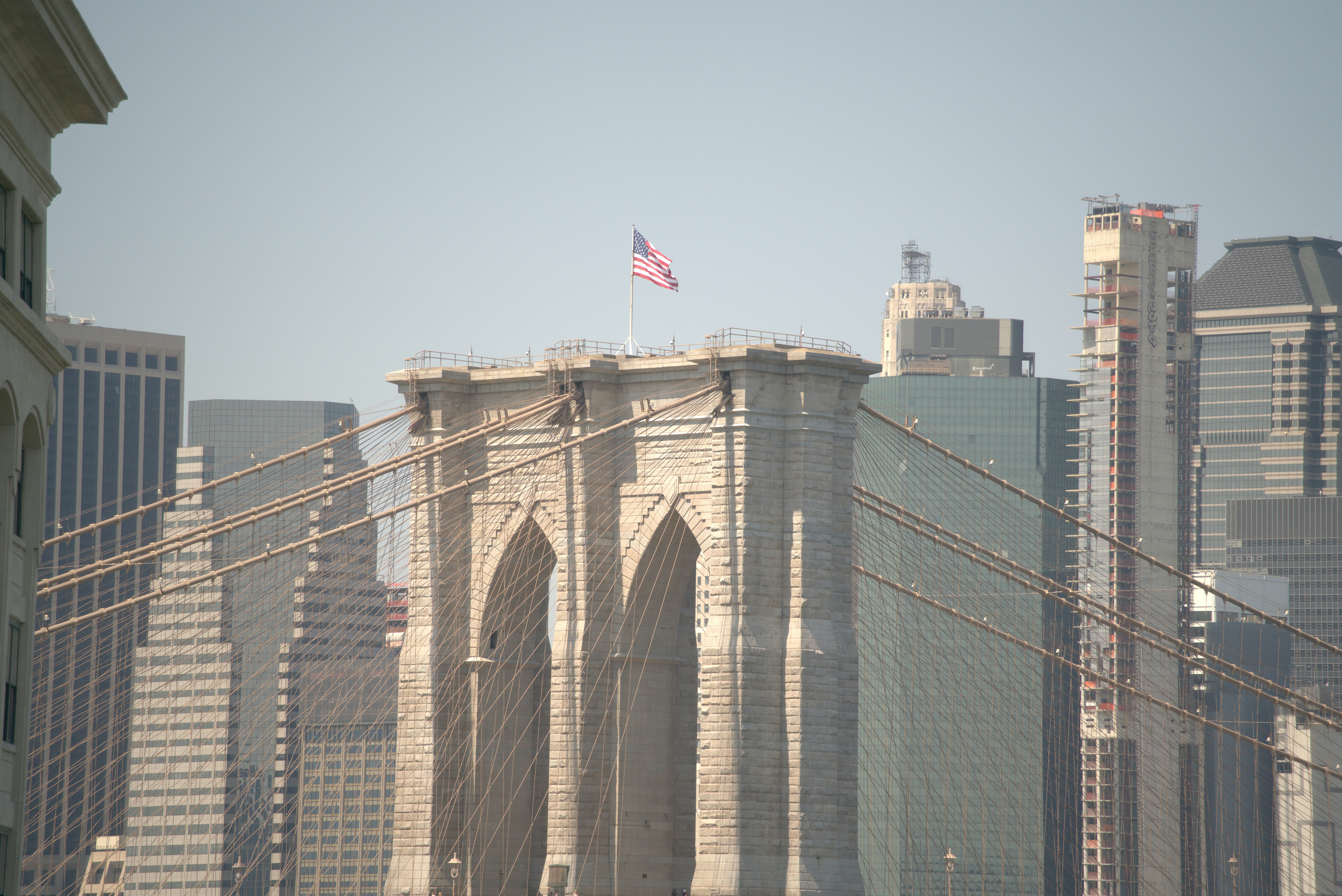 Flag over the Brooklyn Bridge: Cityscape Across the East River