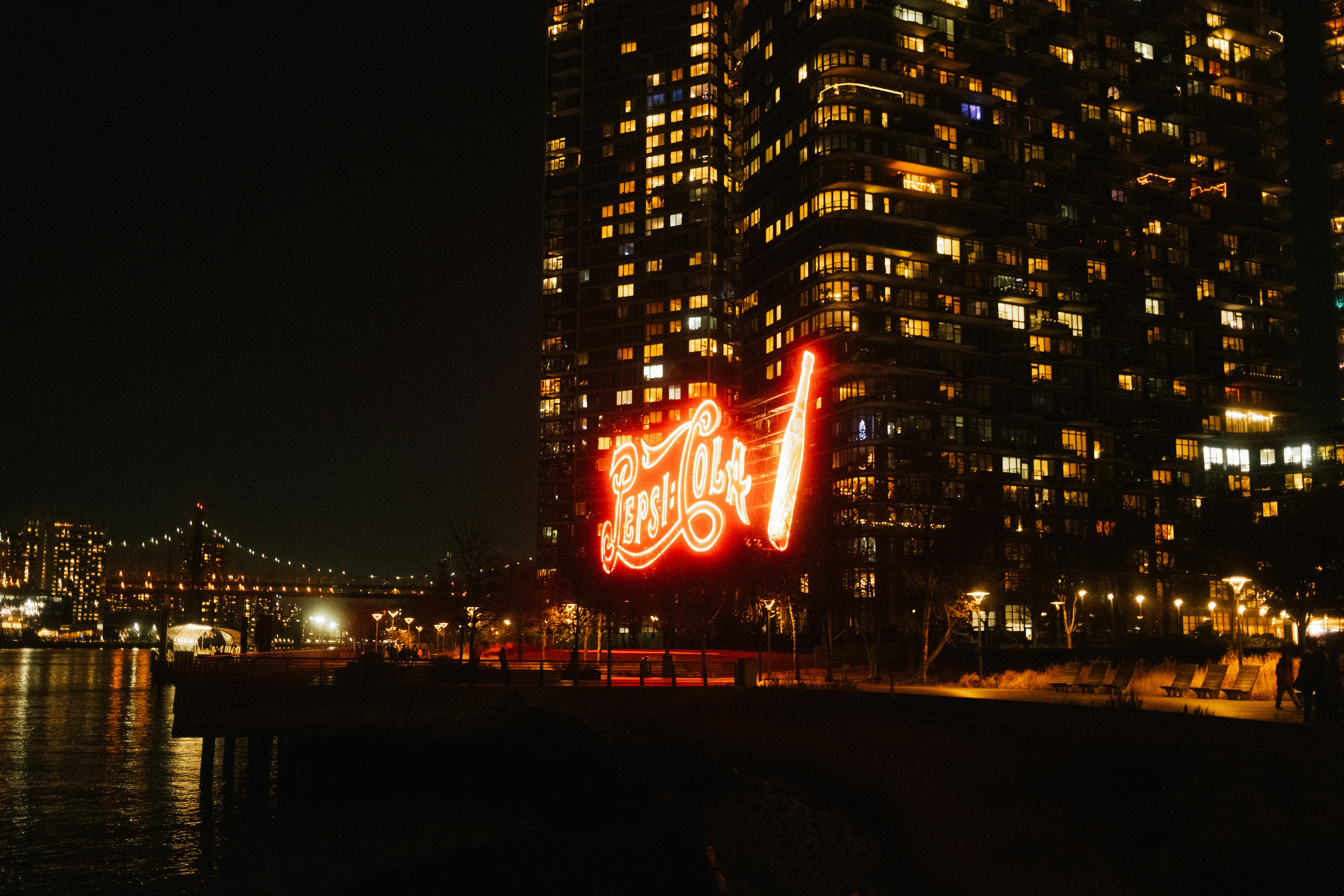 Neon Sign at the Waterfront: Nightscape by the Tower