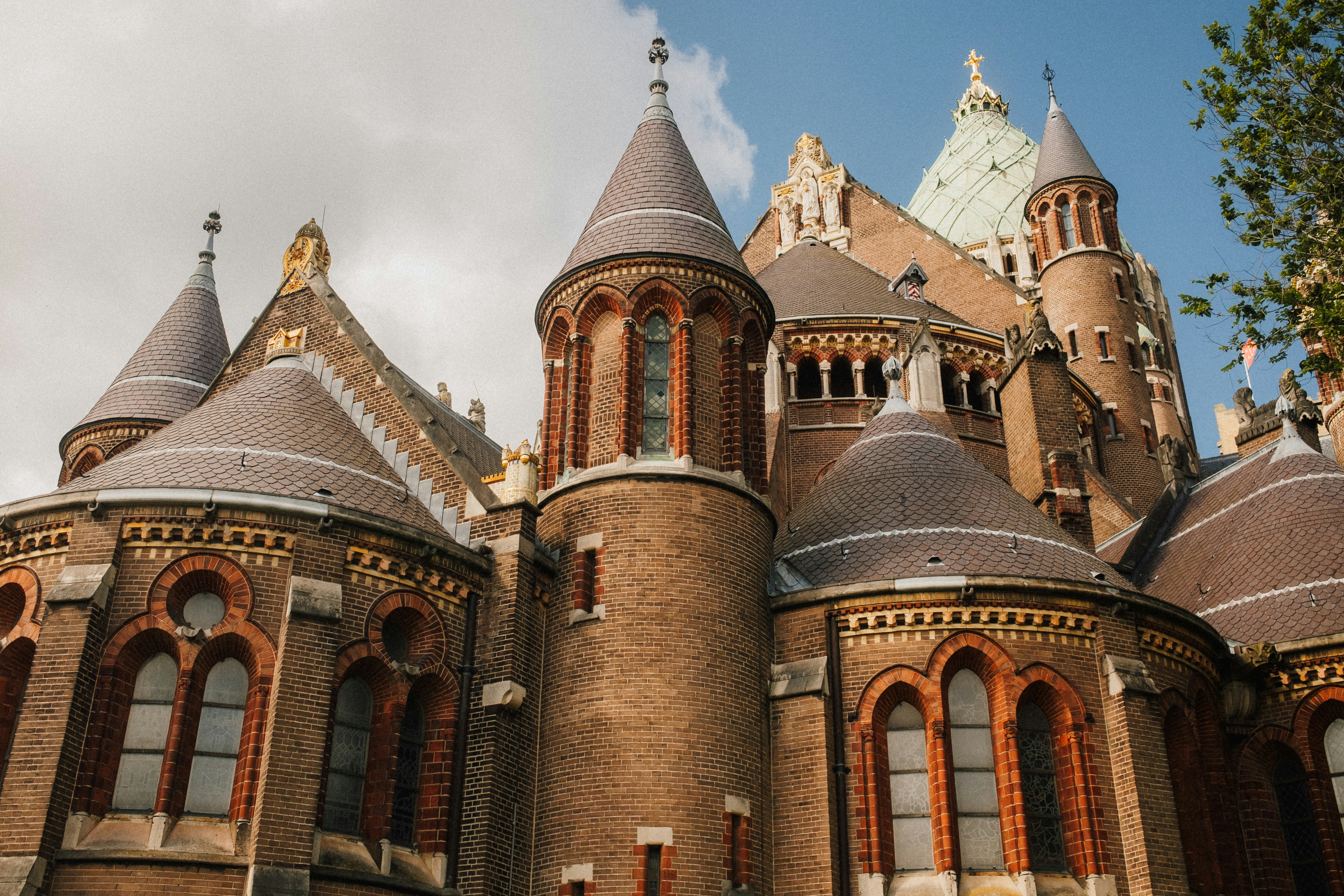 Brick Turrets and Sloping Rooflines: A Close Focus on a Historic Castle Facade