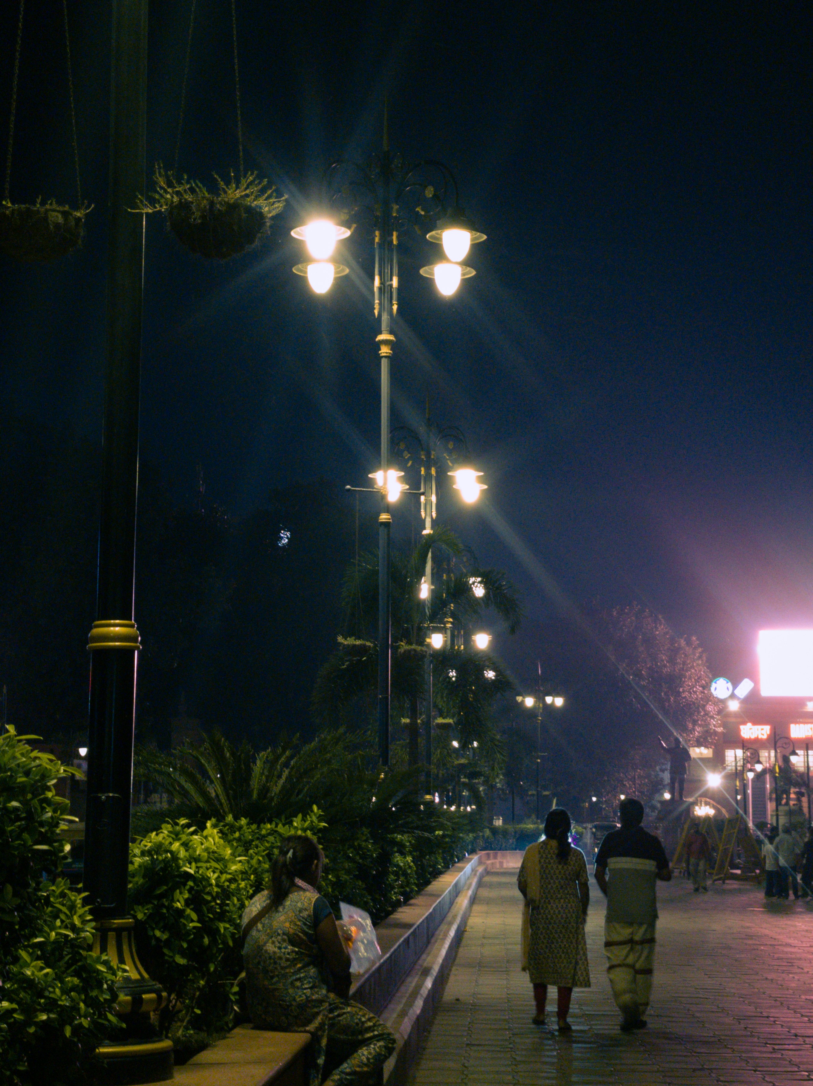 Quiet Night Walk Under Echoes of Street Lamps