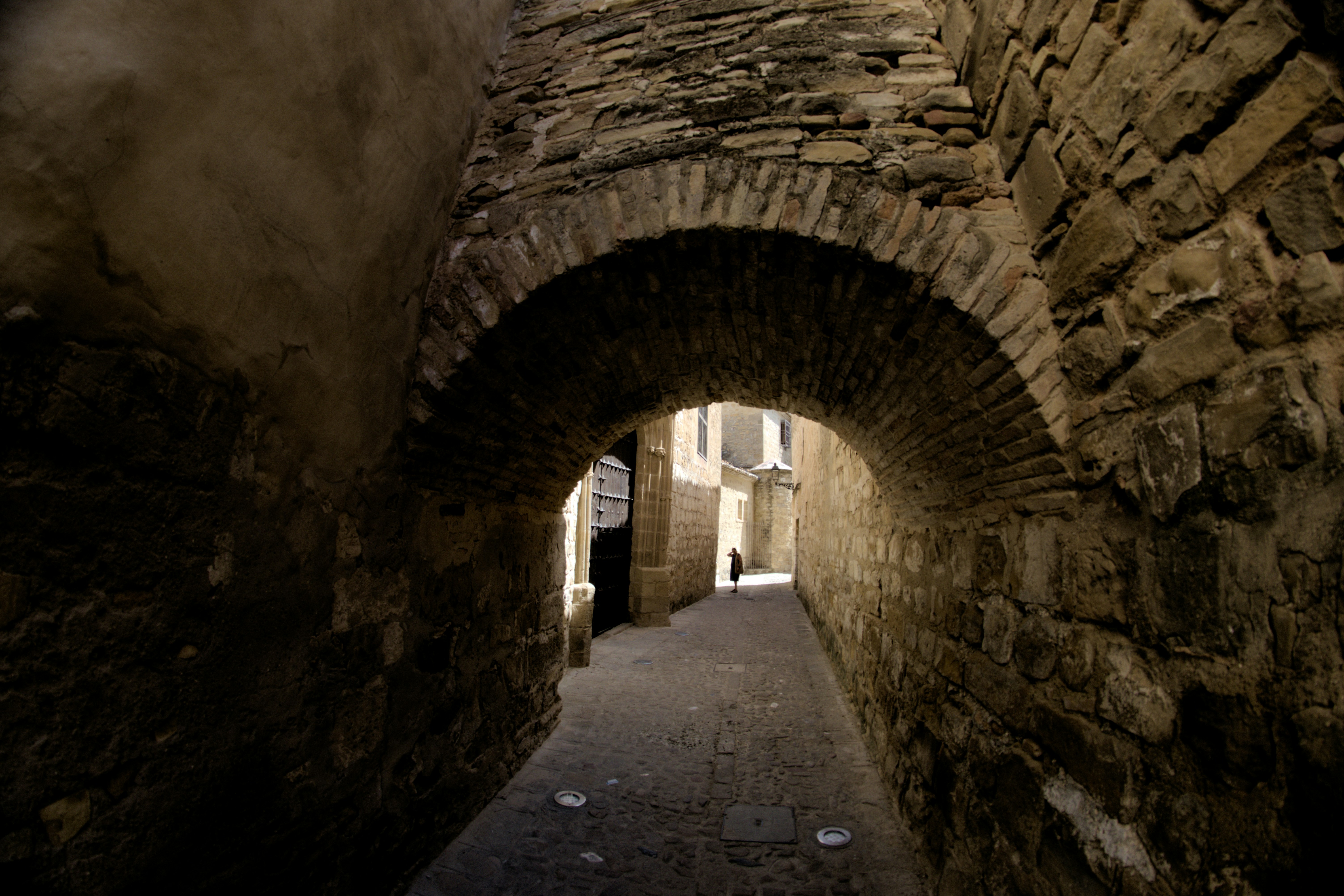 A Narrow Stone Arc Leading to Light