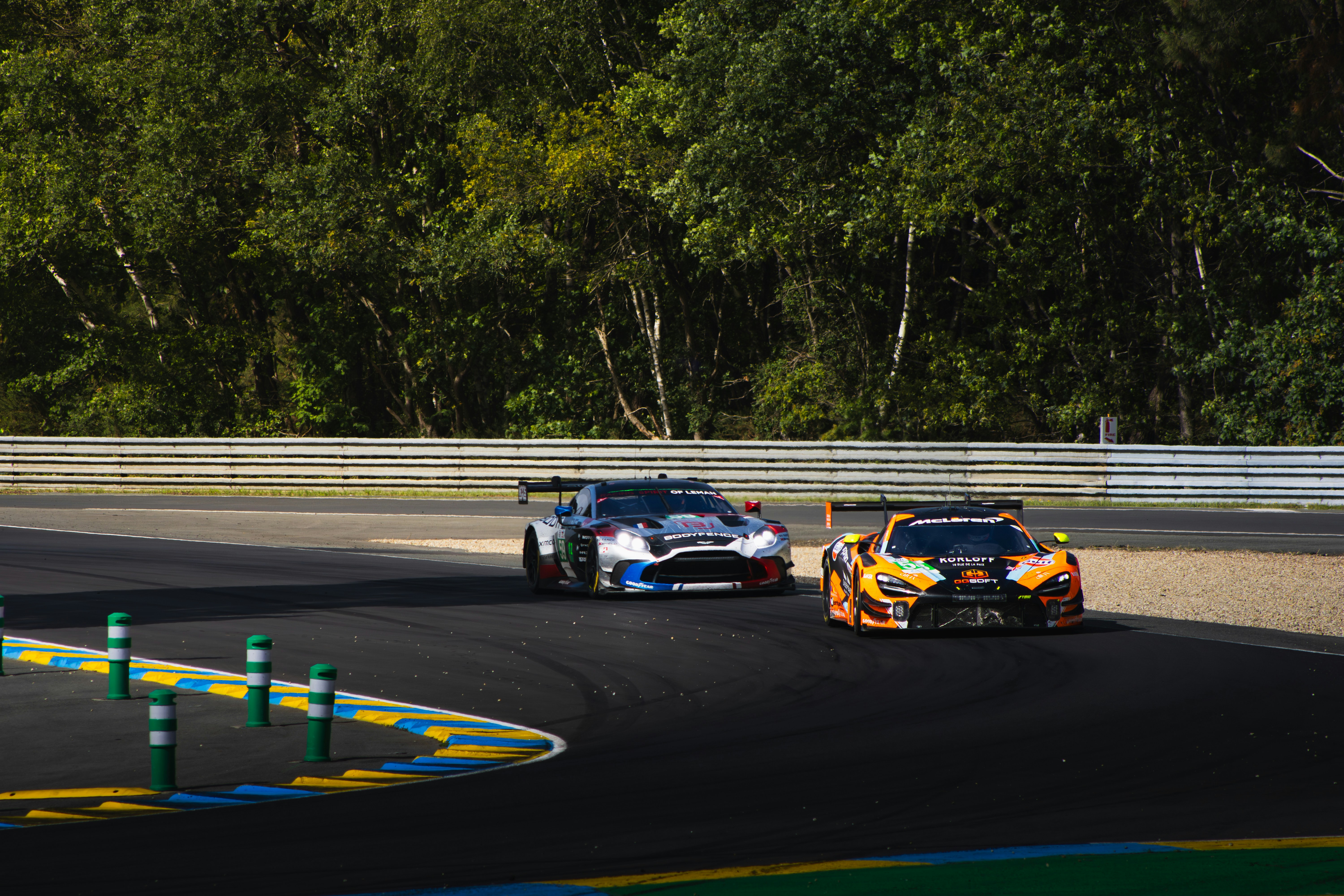 Pursuit on the Curve: Duel of Color on the Race Track