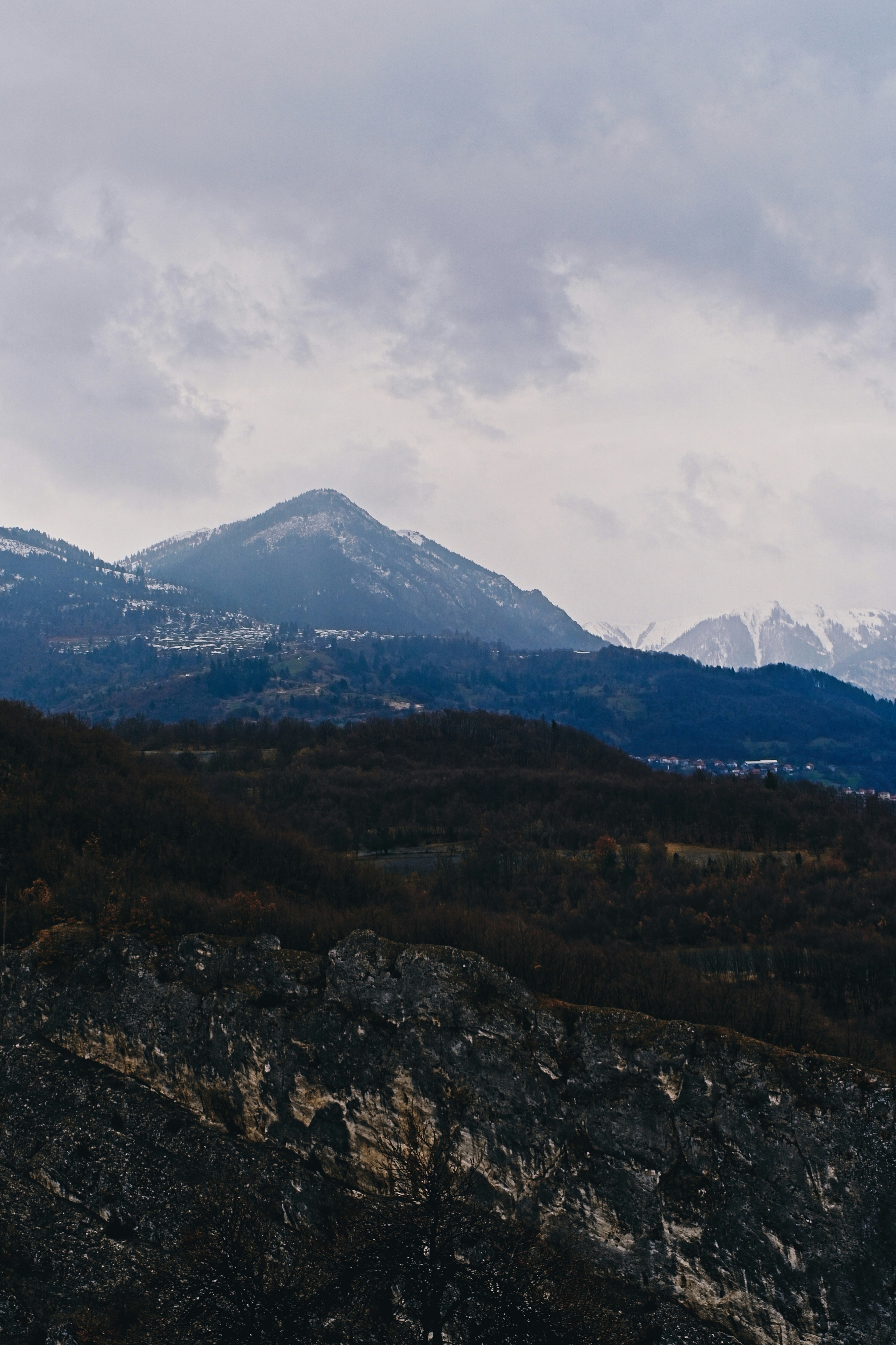 Snow-capped Ridge Rising Over Dark Foreground