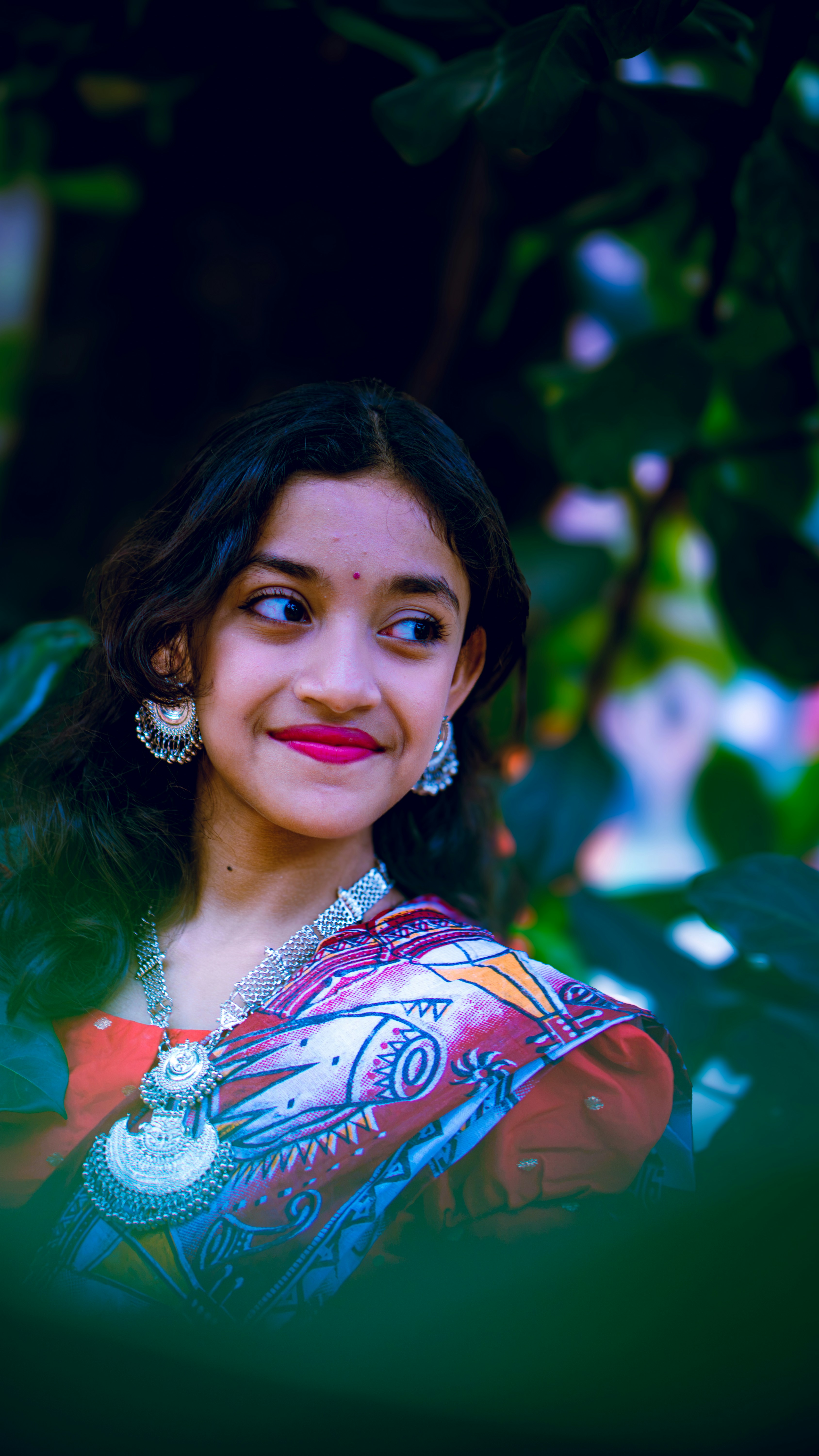 Graceful Gaze in a Garden Portrait