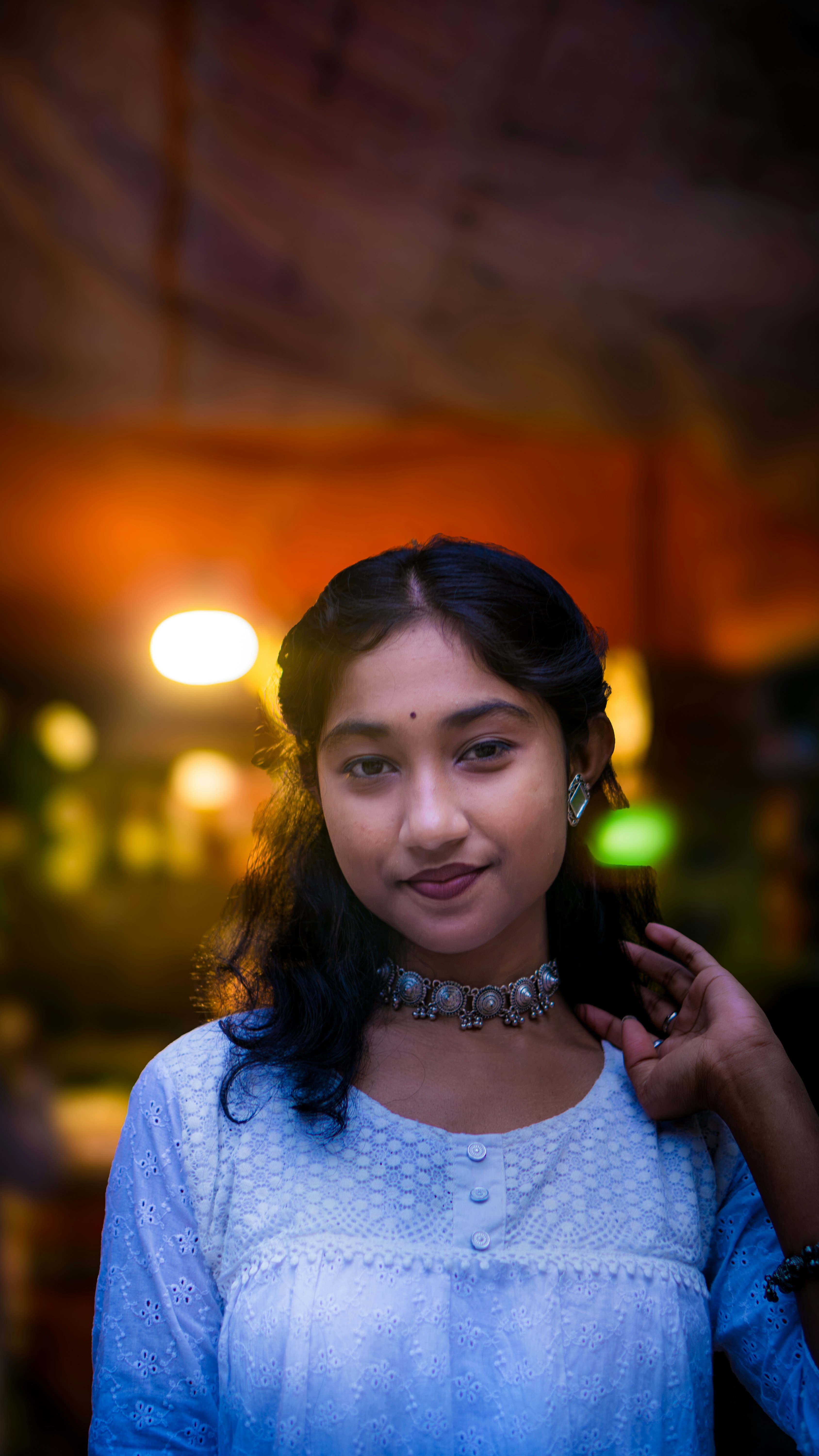 Soft Glow Portrait in a Neon-Backlit Evening