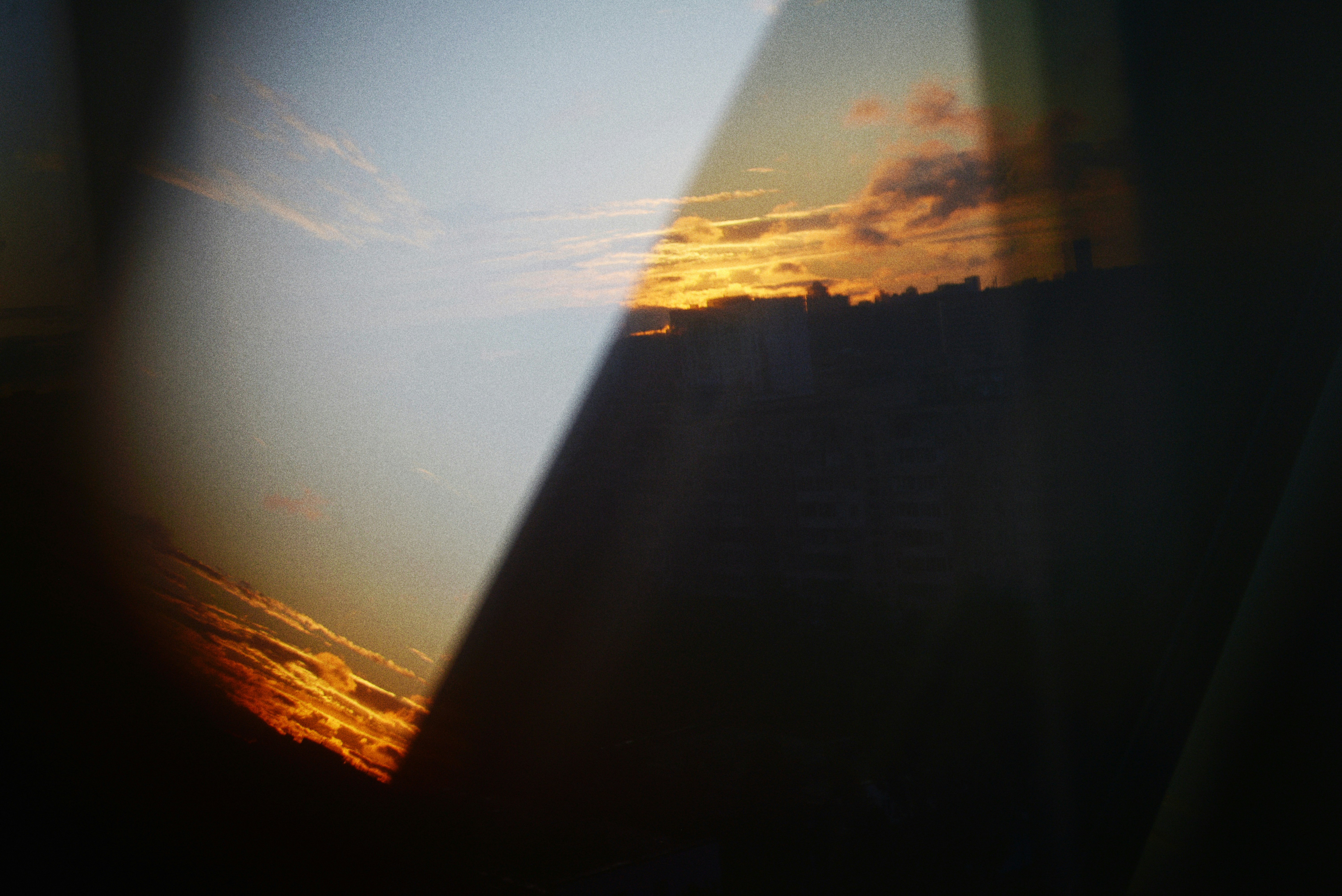 Triangulated sunset through a window diagonal