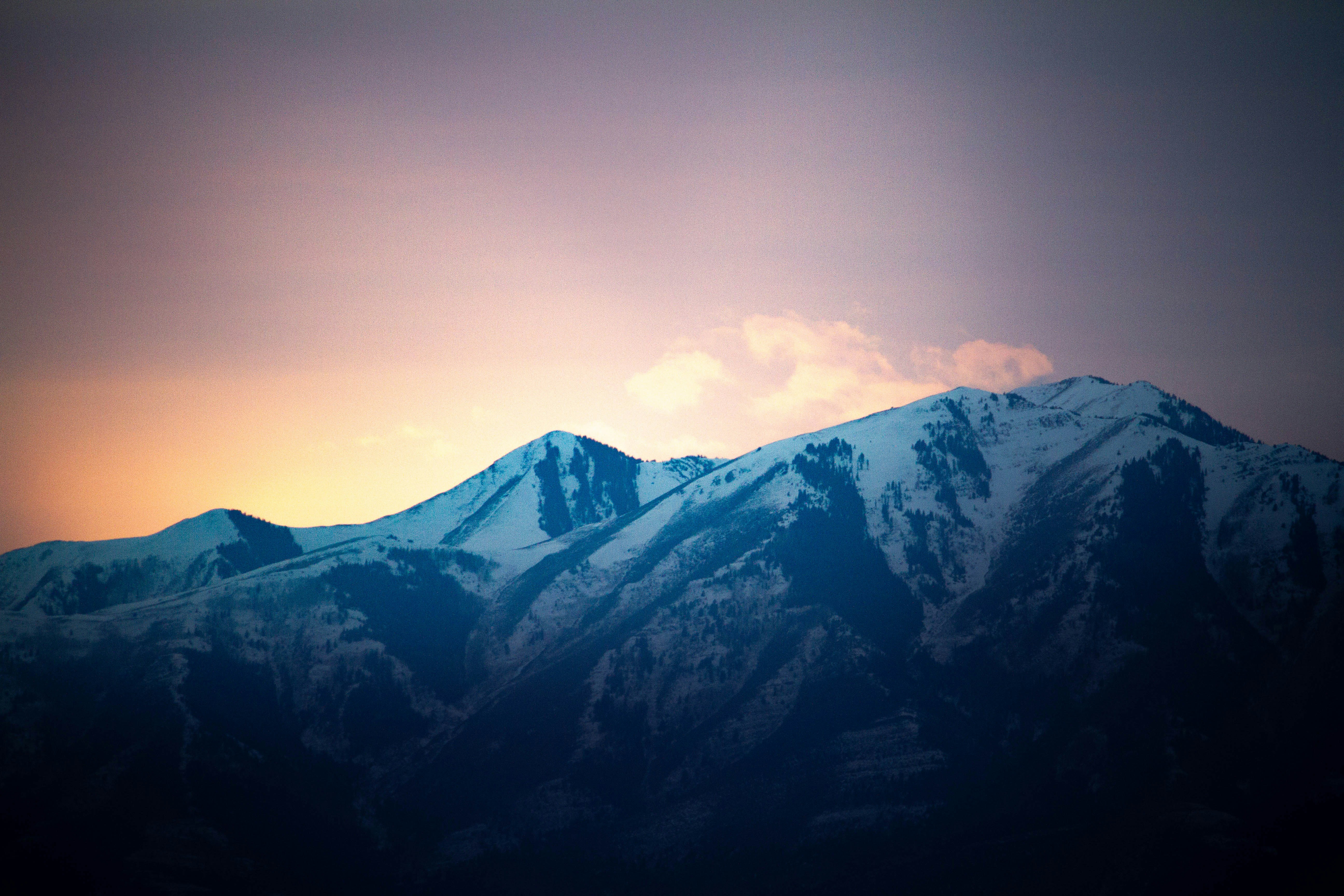 Dawn Over Jagged Blue: Silent Peaks at First Light
