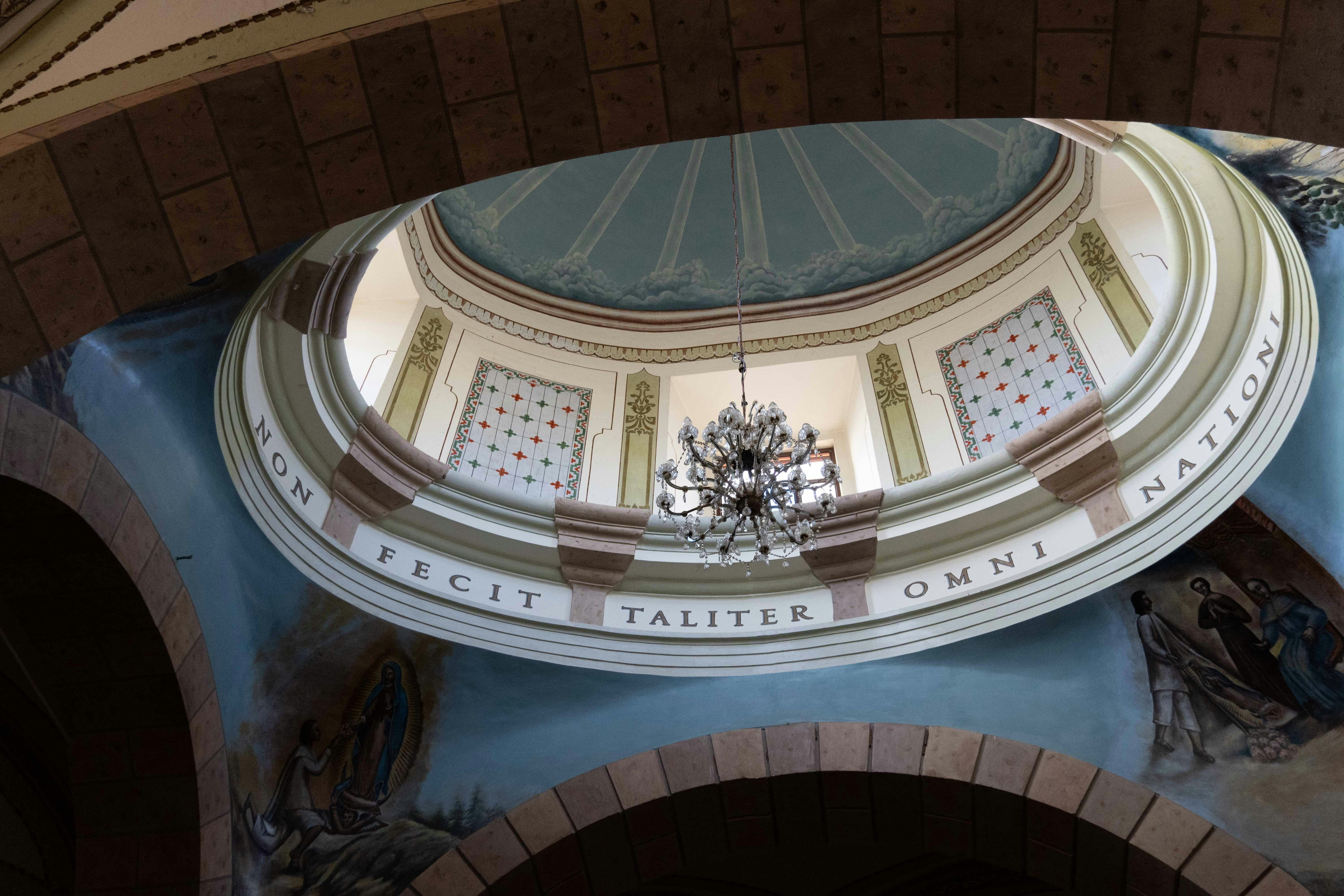 Dome of Light: A Battered Archway Framing an Elegant Ceiling