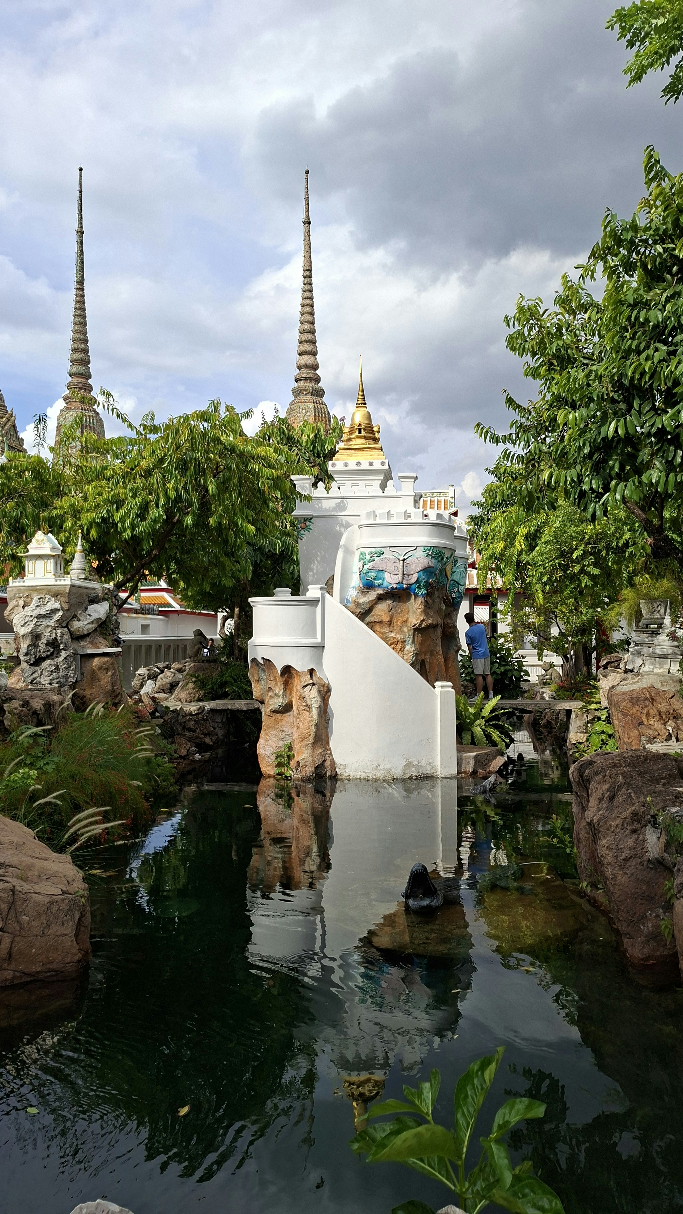 Pagoda Reflections: A Quiet Oasis Behind White Steps