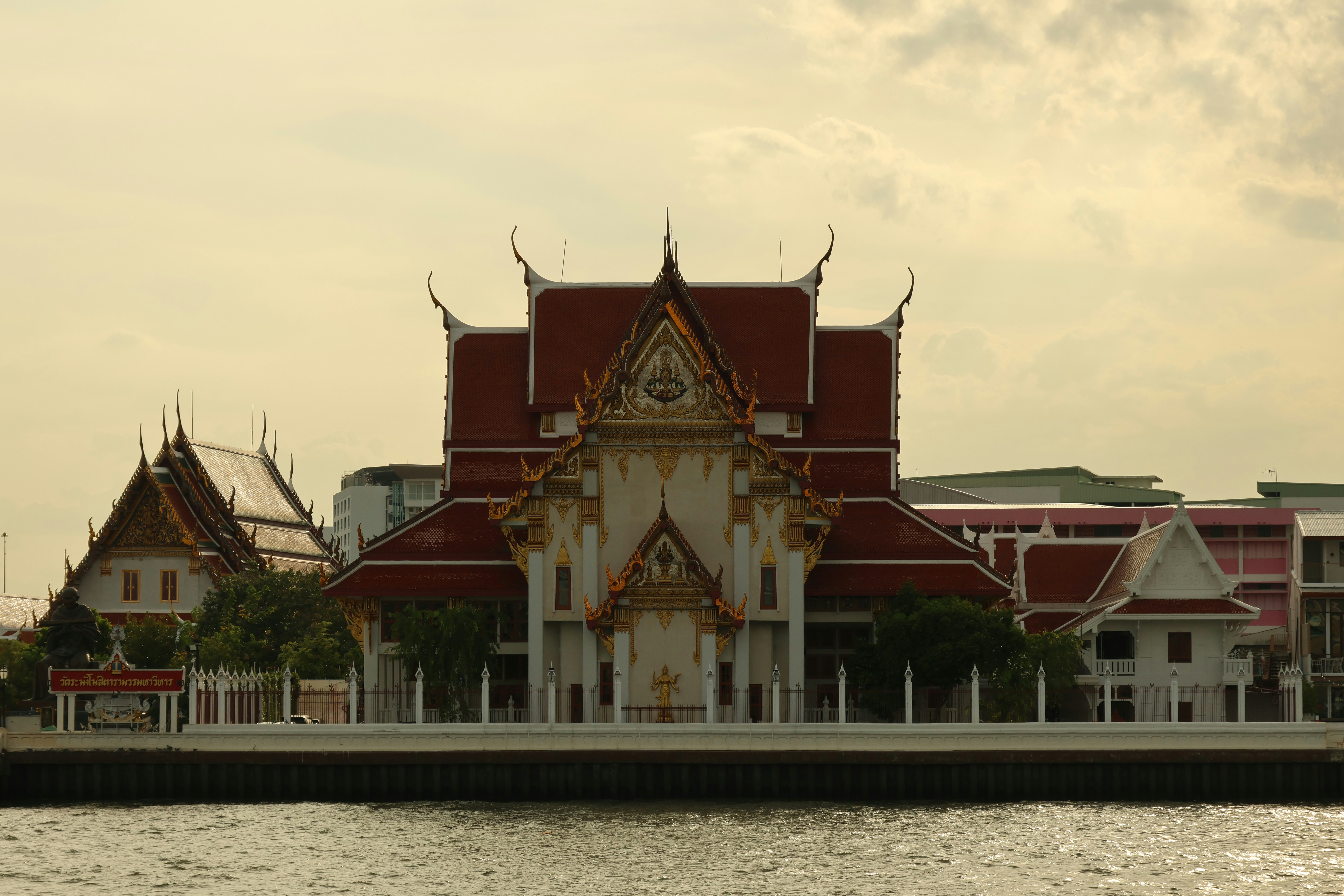 Sunlit Temple by the Riverside