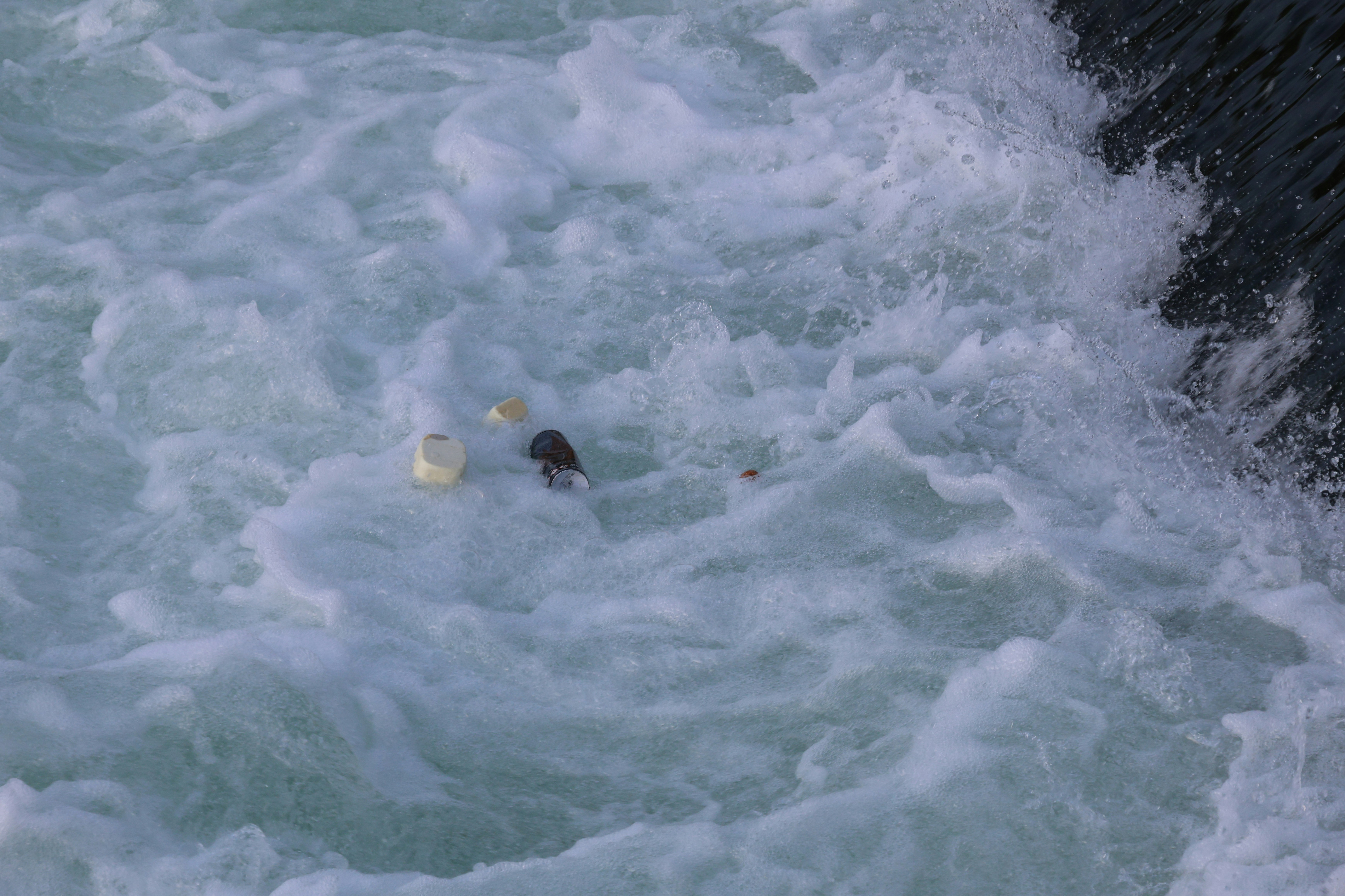 Surging Whitewater with Submerged Bystander
