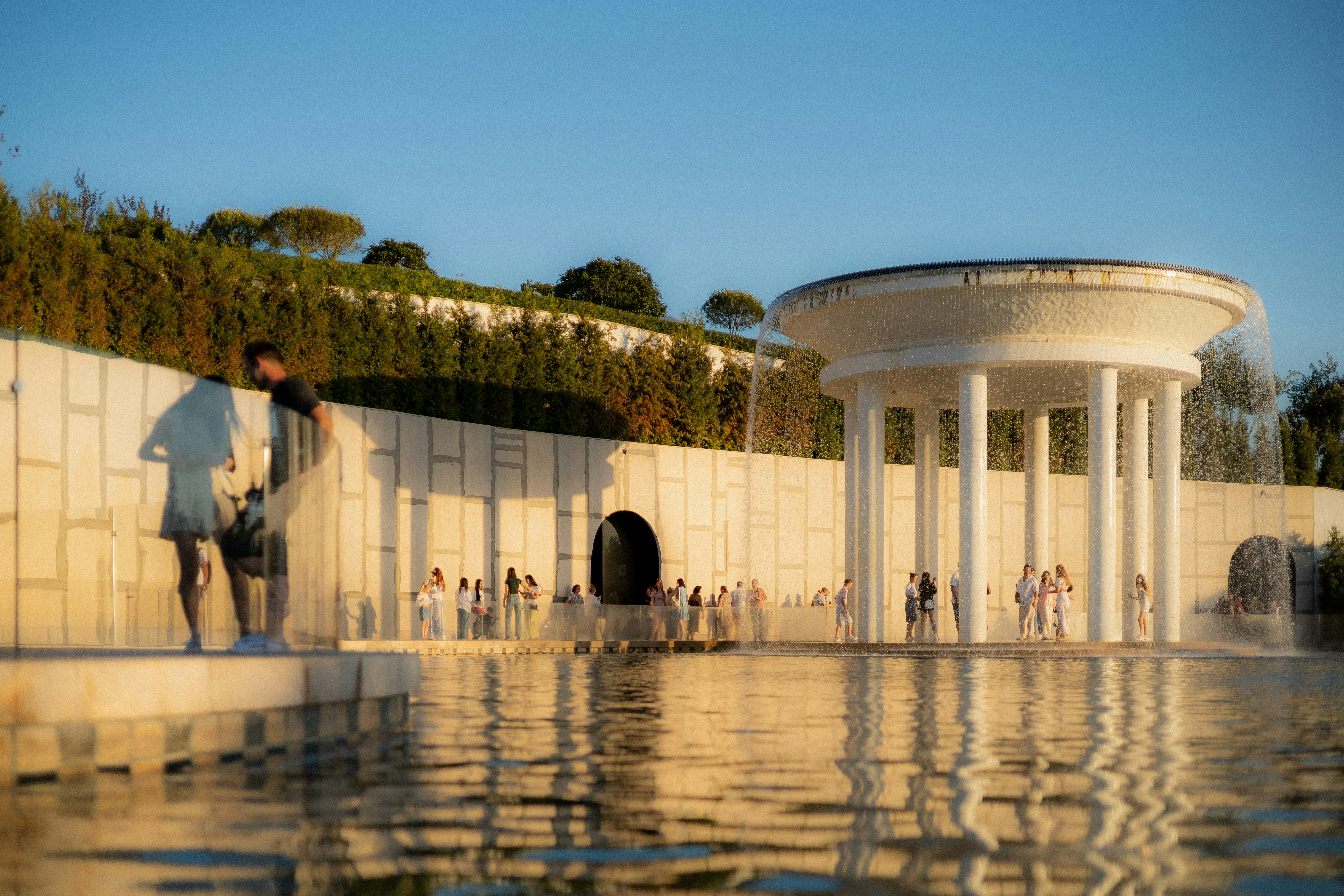 Reflections at the Rotunda: Sunlit Axis and Glass Wall
