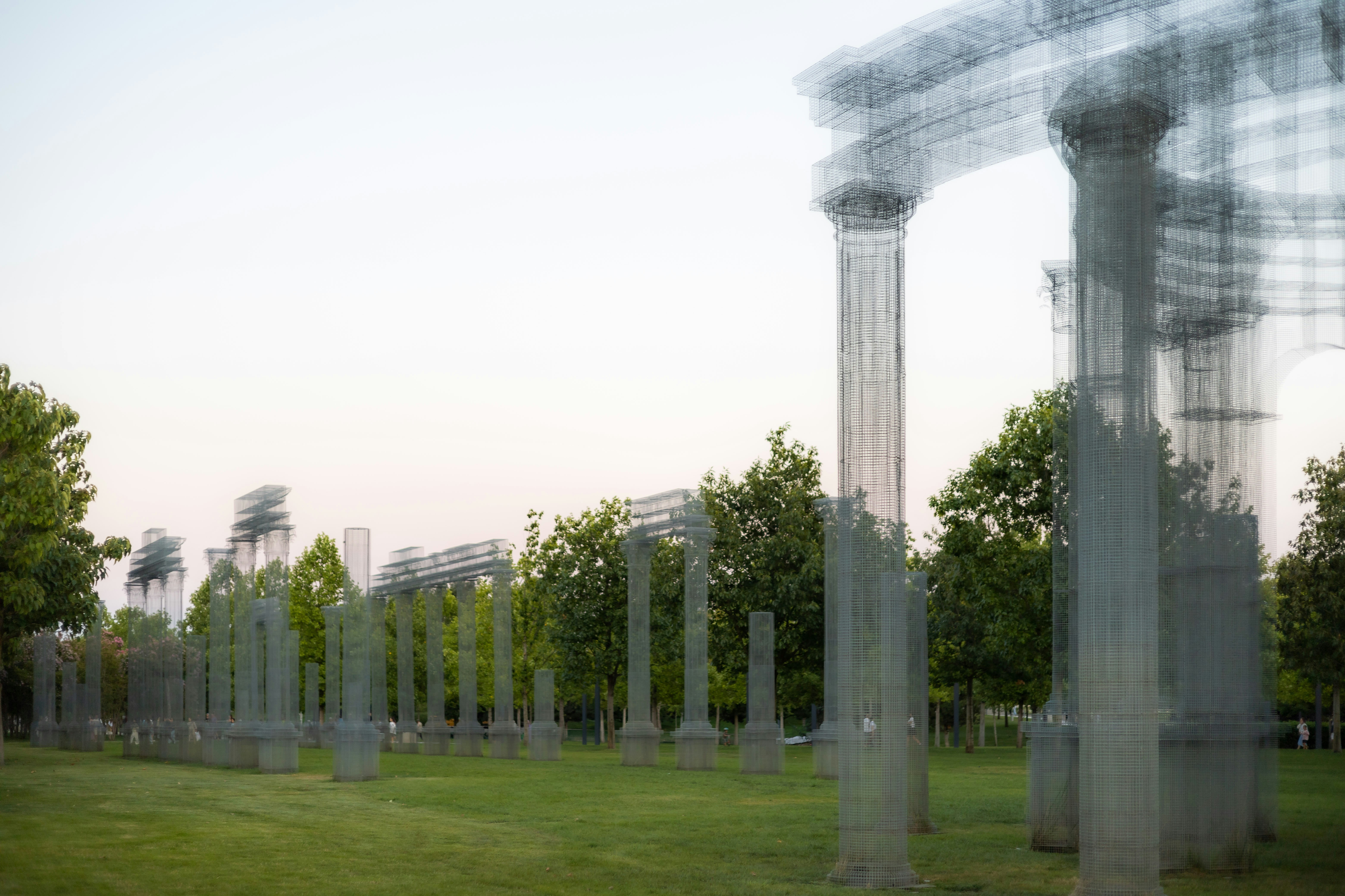 Echoes of Time: Semi‑Transparent Columns in Dusk