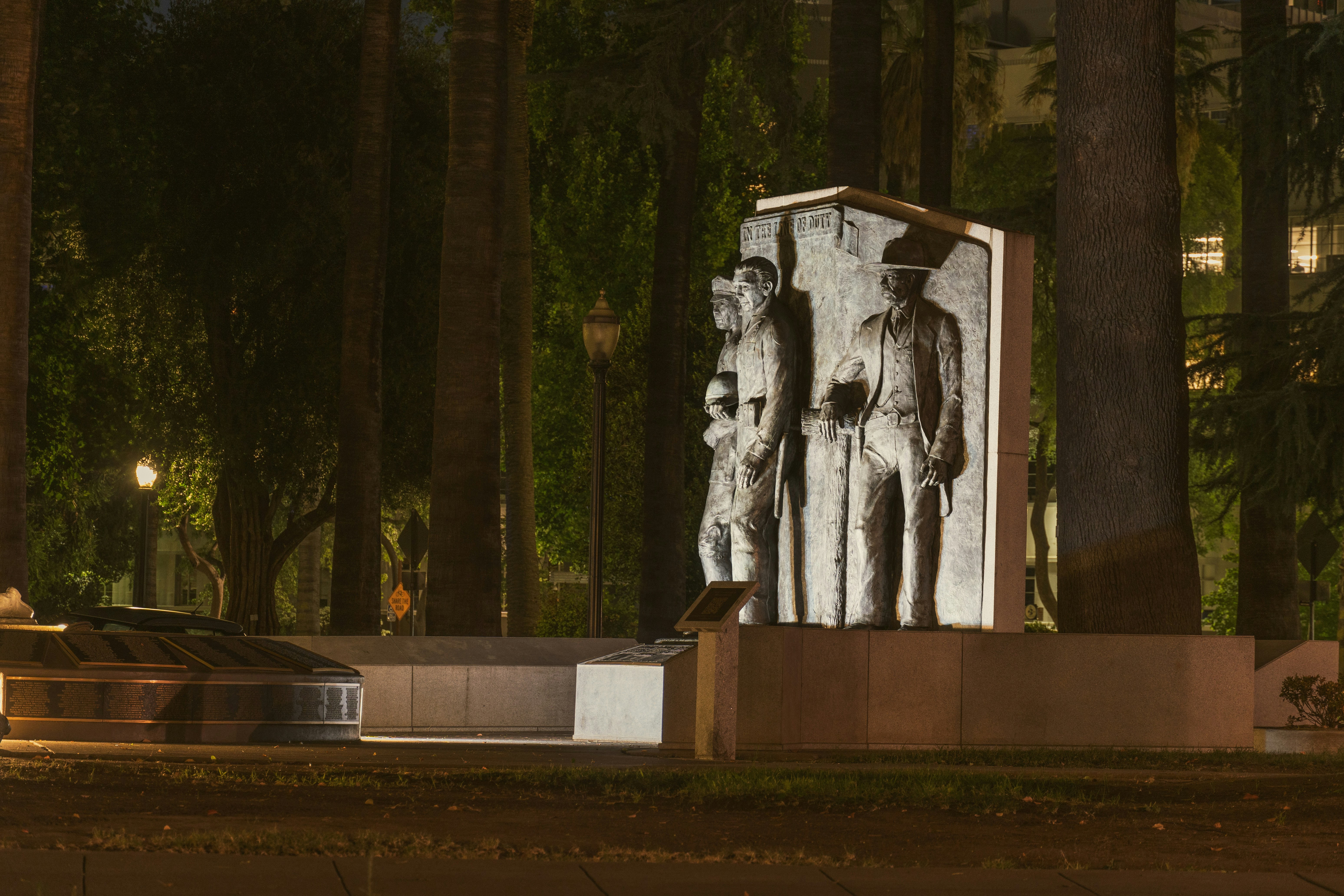Monumental Shadow: A Night Stroll by the Silent Relief