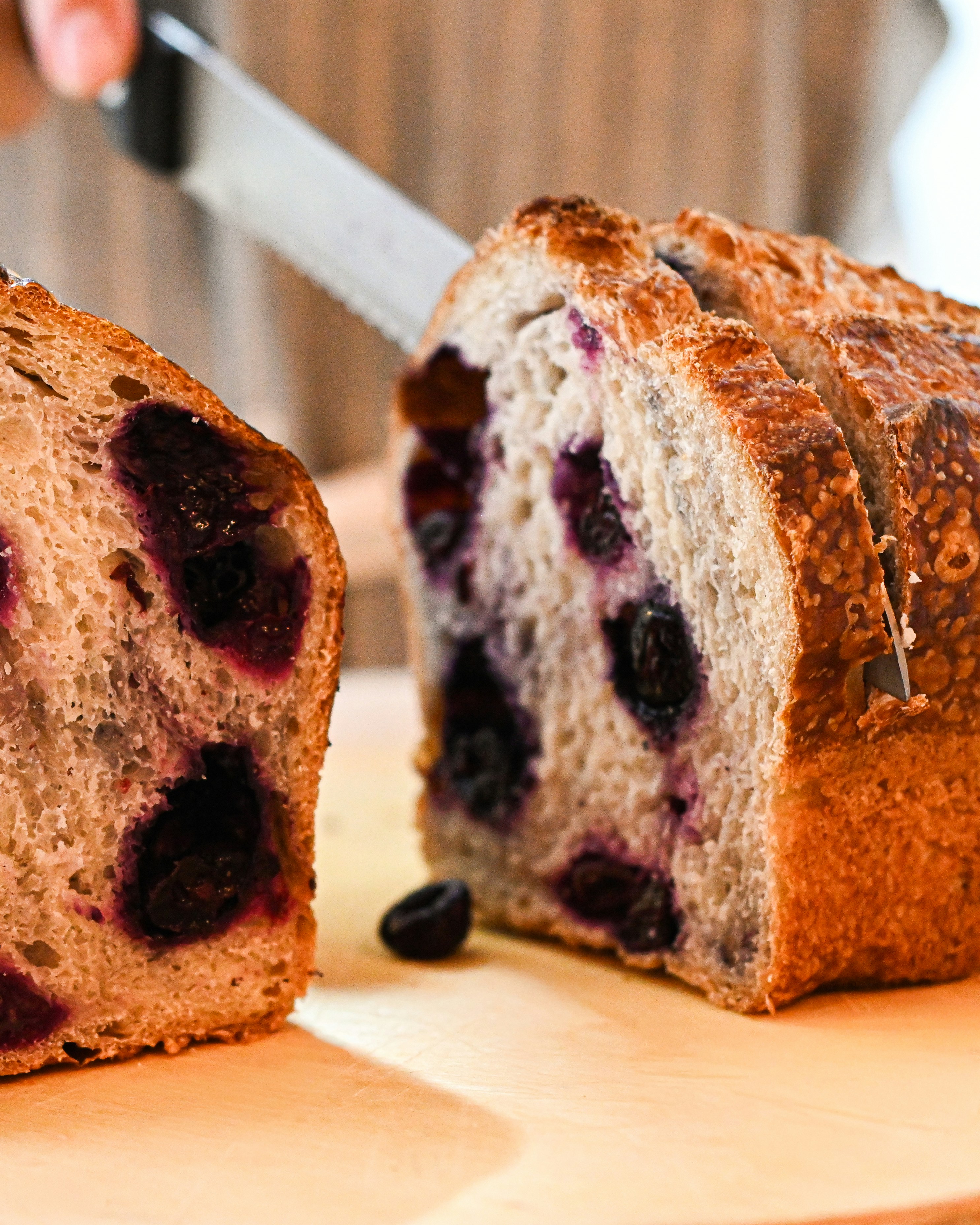 Crusty Berry-Loaf in the Moment of Slicing