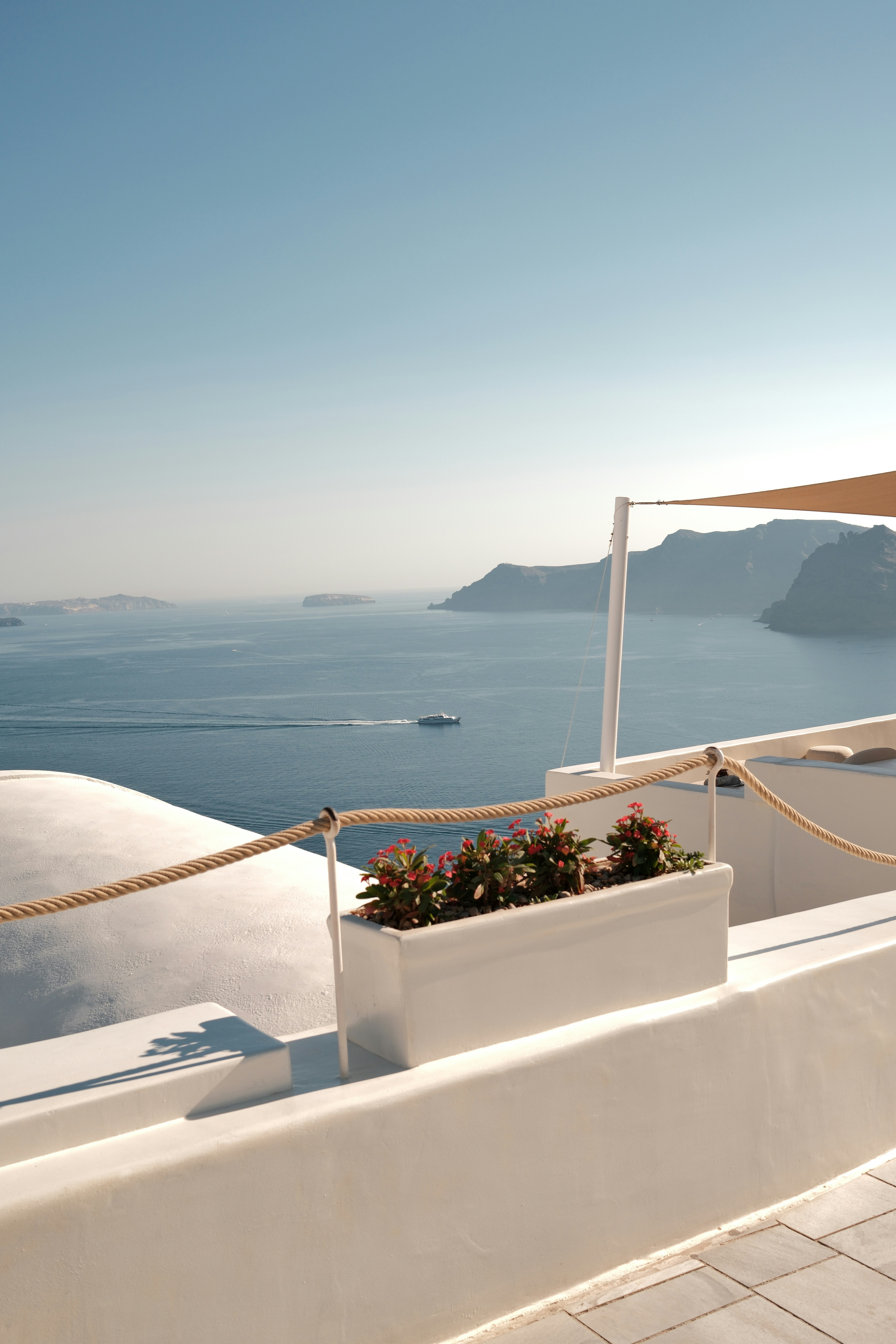Azure Terrace: Sea, Sky, and Whitewashed Edges