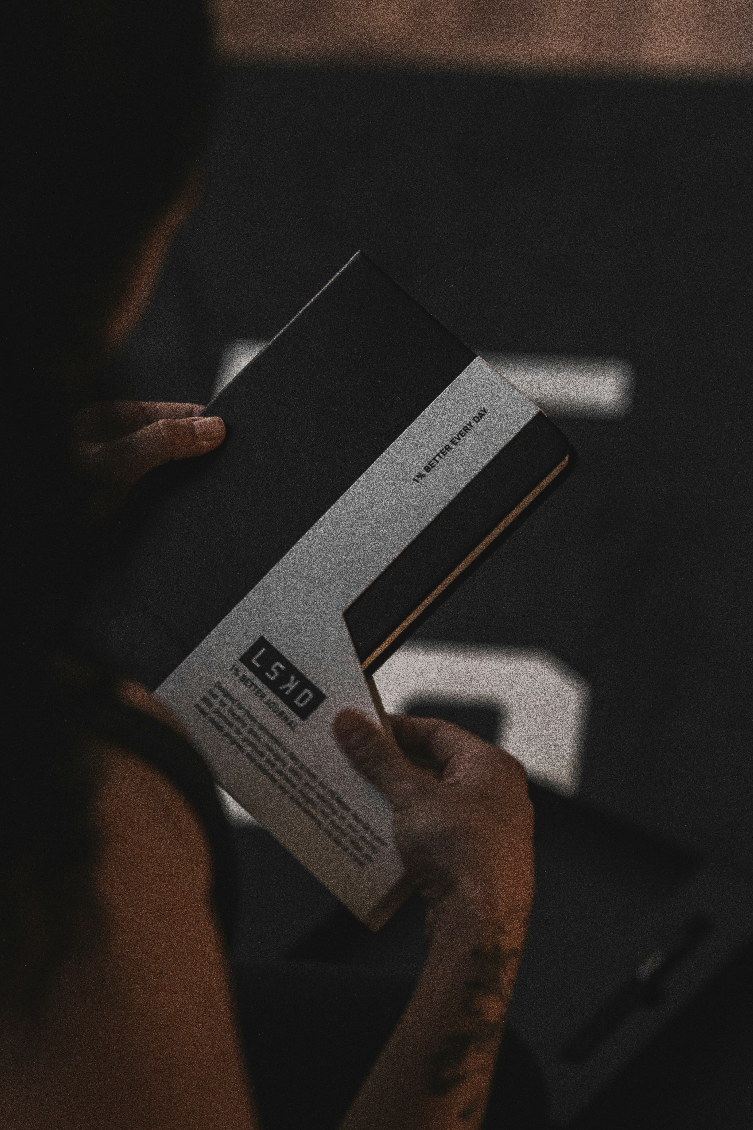 Hands on a Mystery: A Cardholder's Quiet Moment with a Dark Wallet