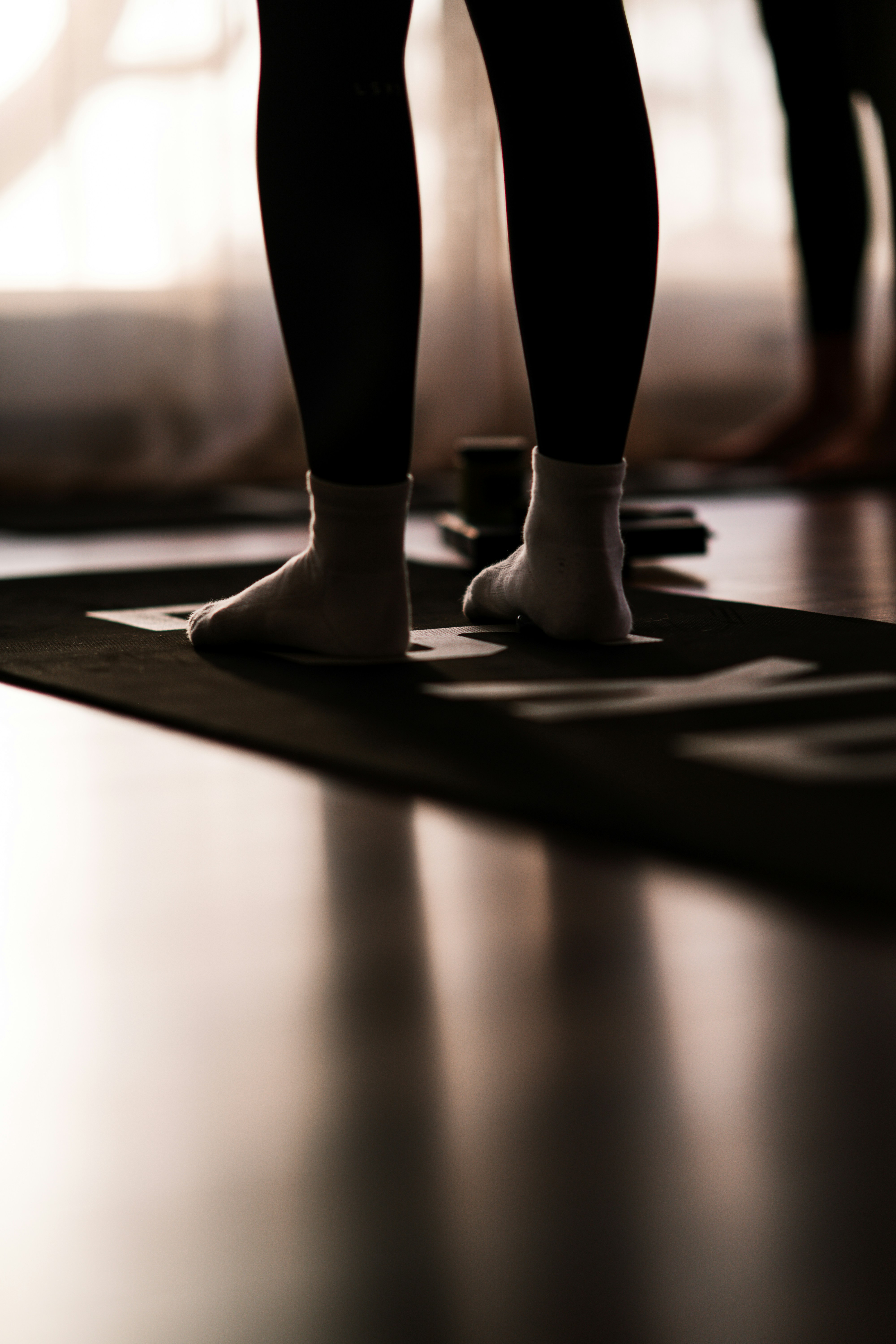 Silhouetted Yoga Mats: Steps into the Soft Amber Light