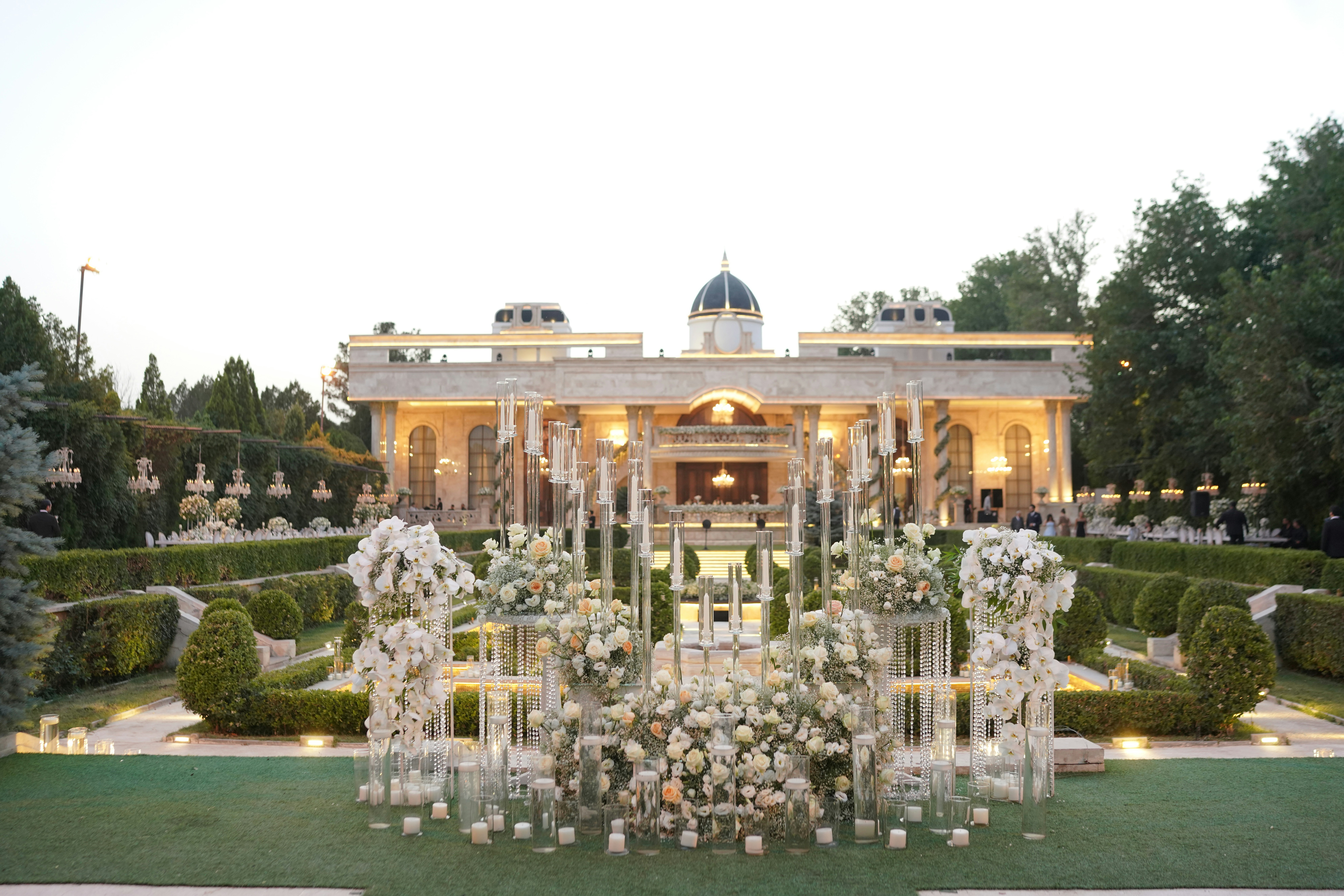 Symmetrical Garden Altar: Lanterns and Florals Framing a Classical Pavilion