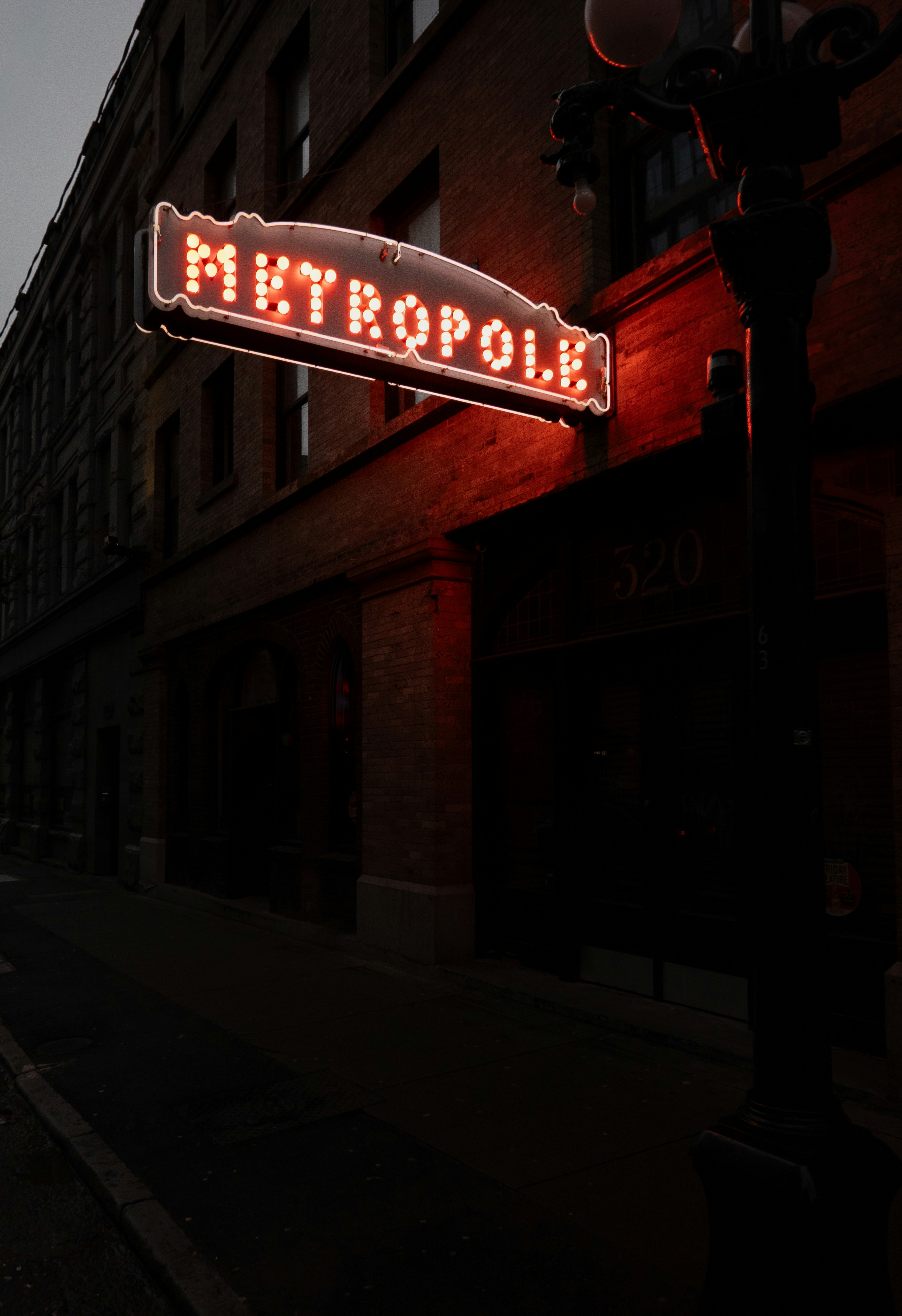 Neon Metropolis: Red Sign of the City Night