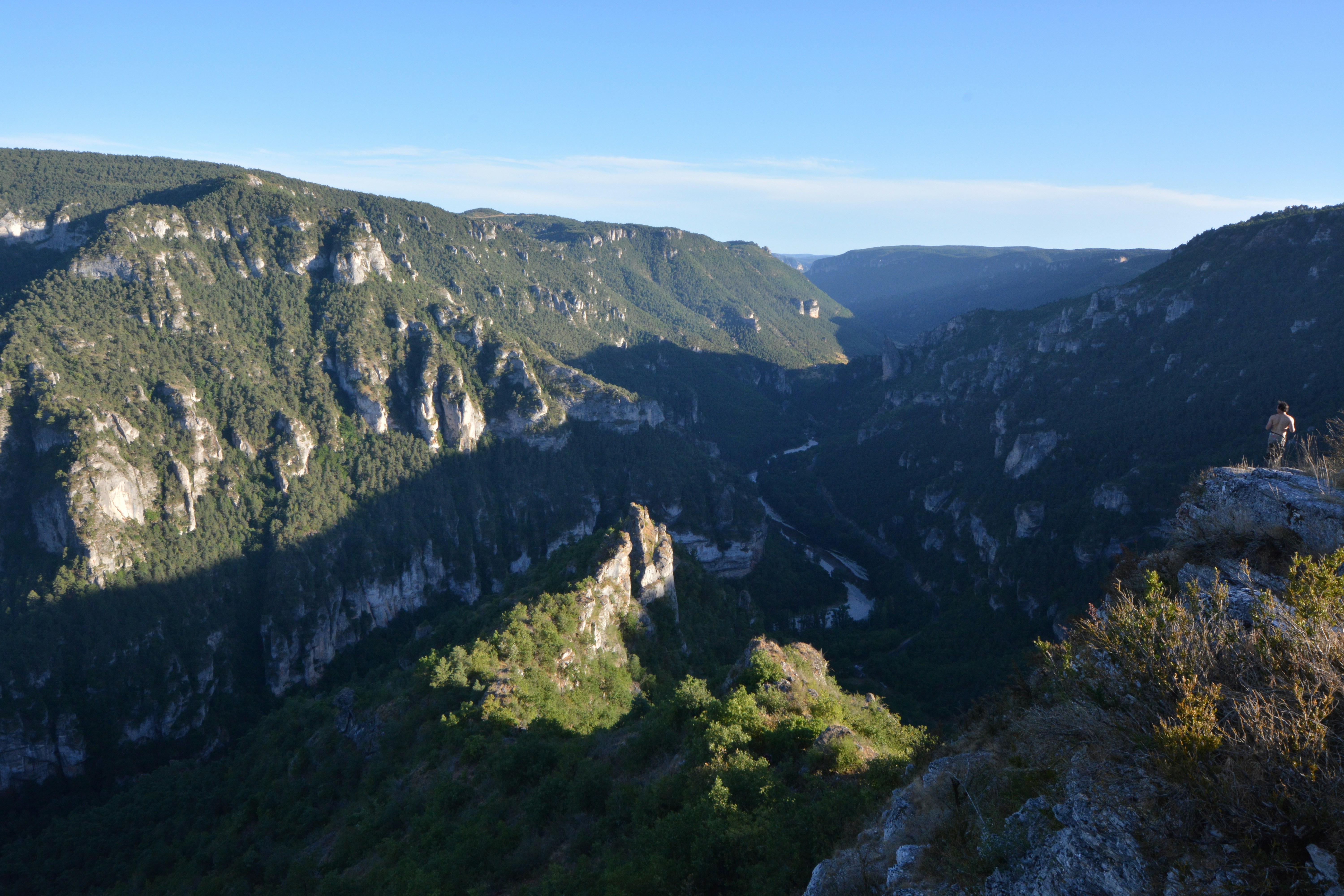 Overlooking the Grand Canyon-like Gorge from a Sunlit Ridge