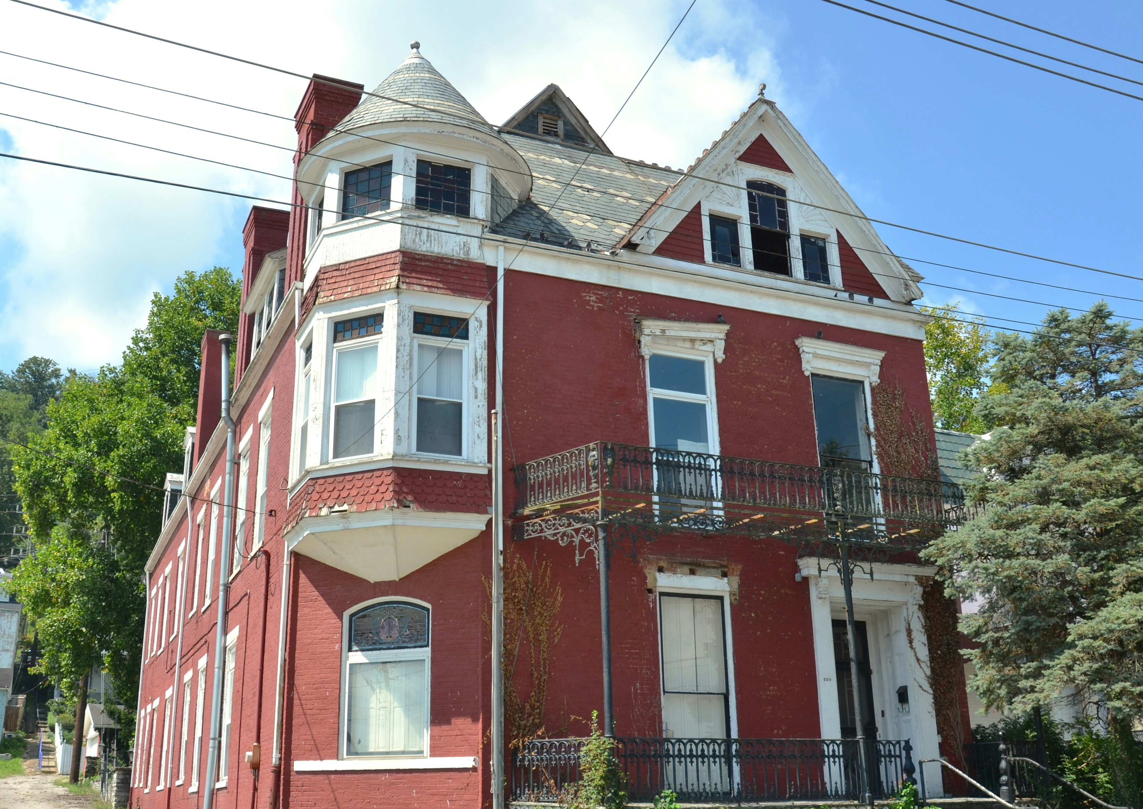 Red Brick Victorian Corner House with Turret Outlook