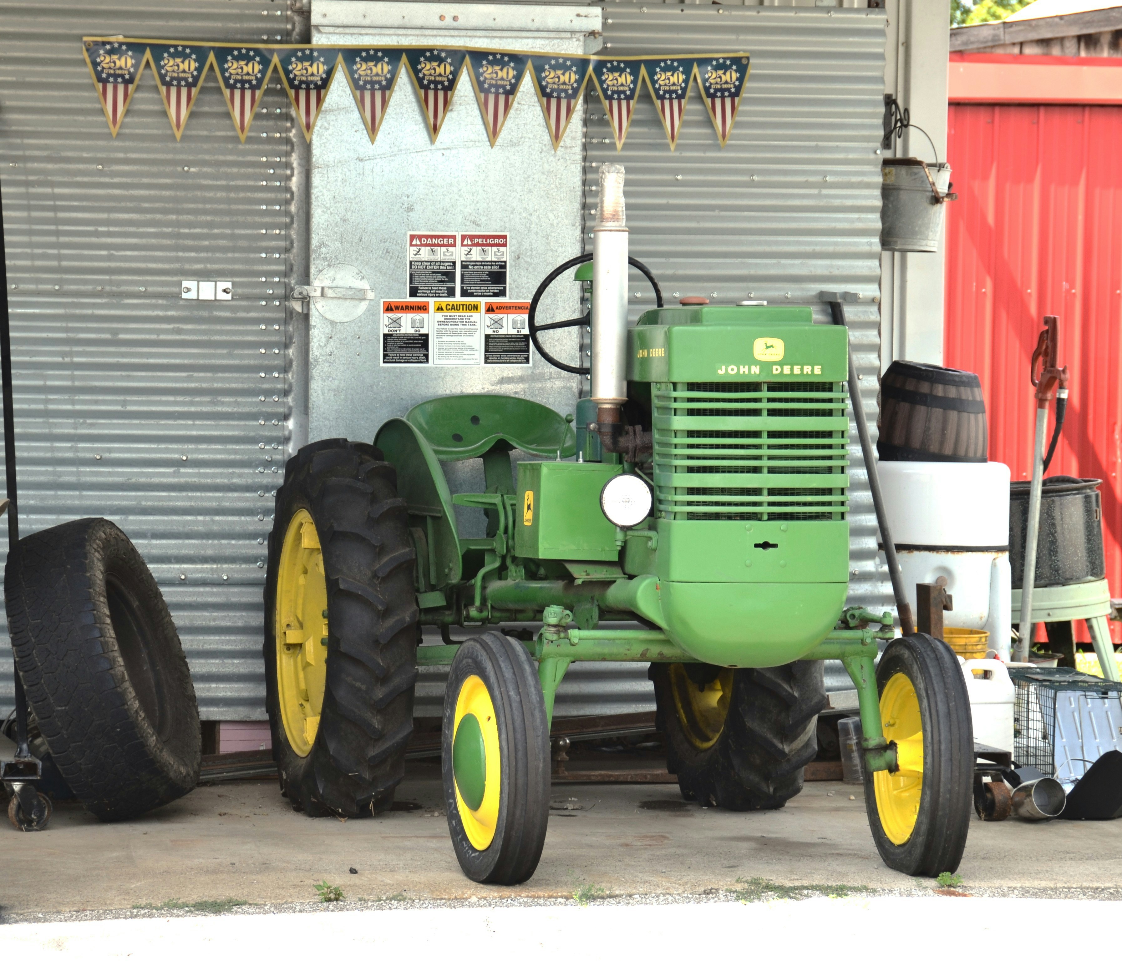 Green John Deere Heritage in a Workshop Backdrop