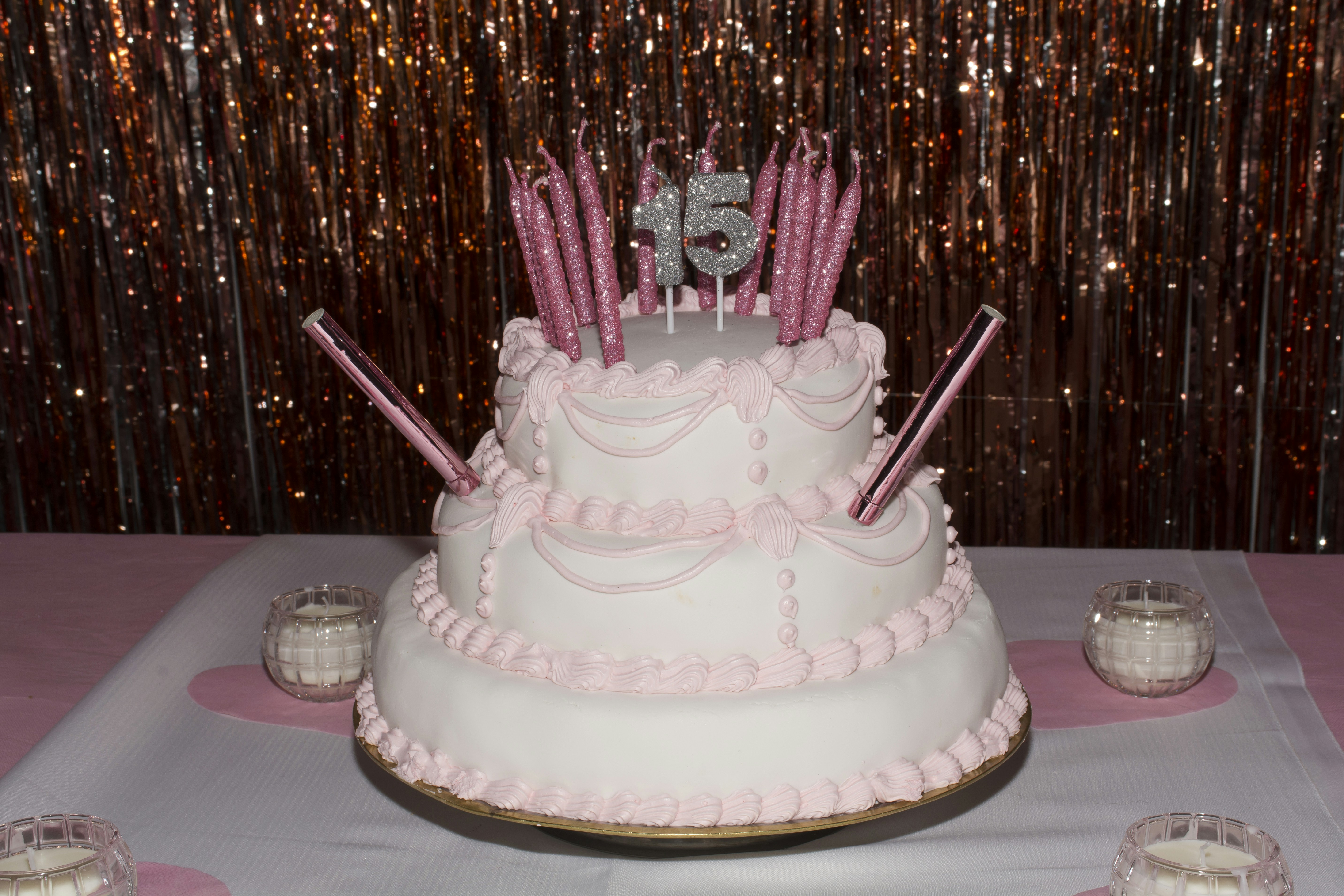 Pastel Birthday Cascade: A Pink Candlelit Celebration