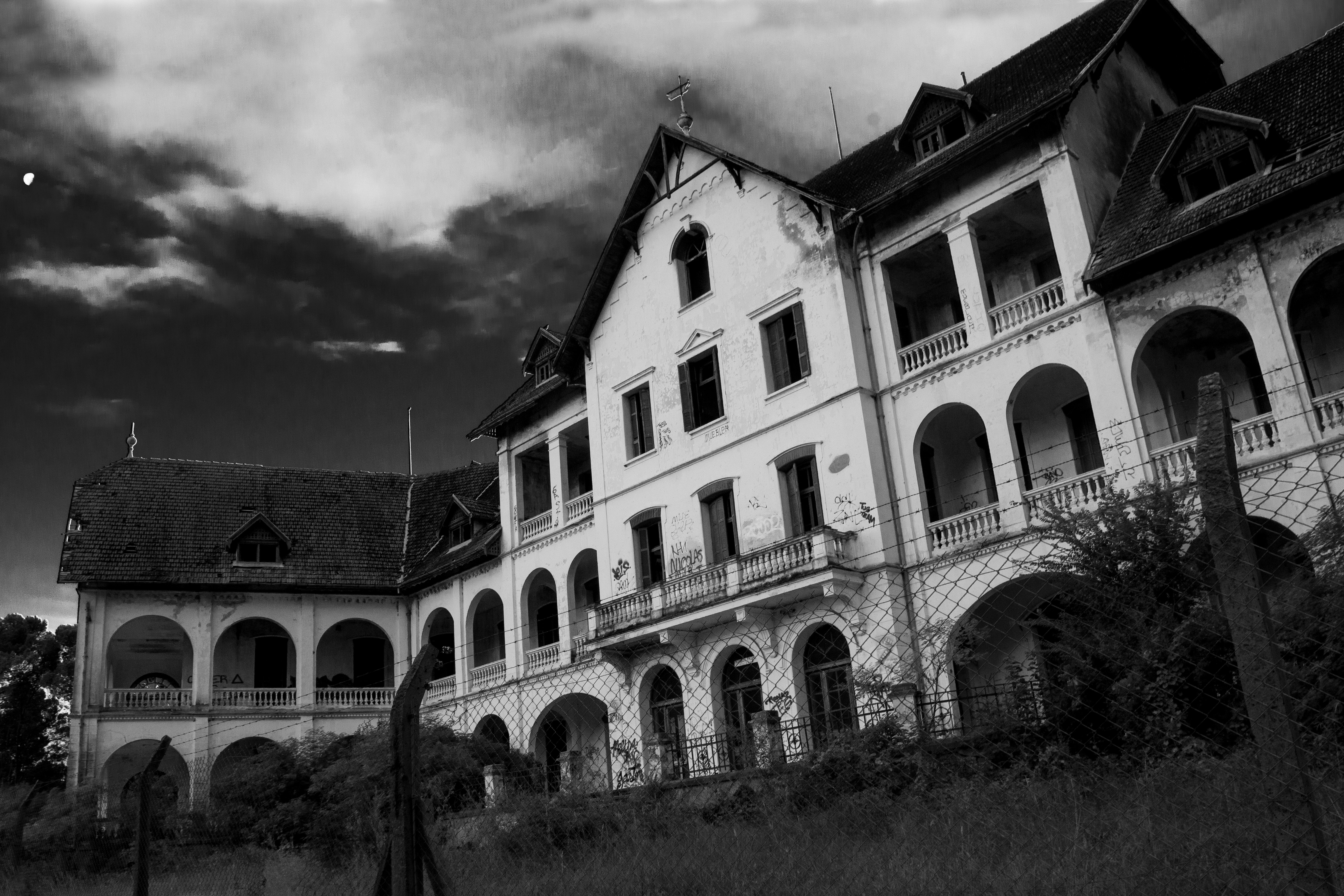 Derelict Manor Under a Stormy Sky