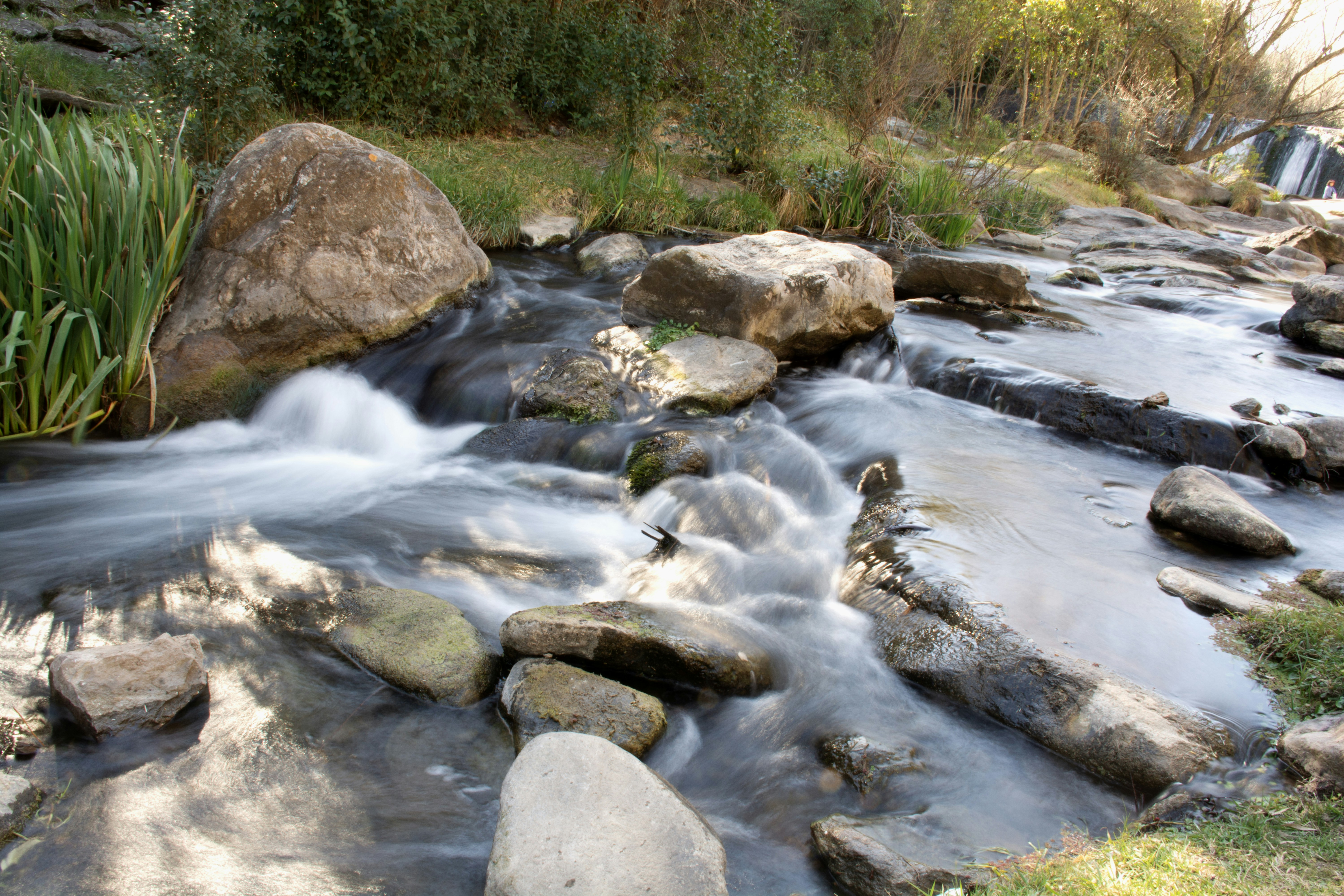 Whispering Cascade over Evening Stones