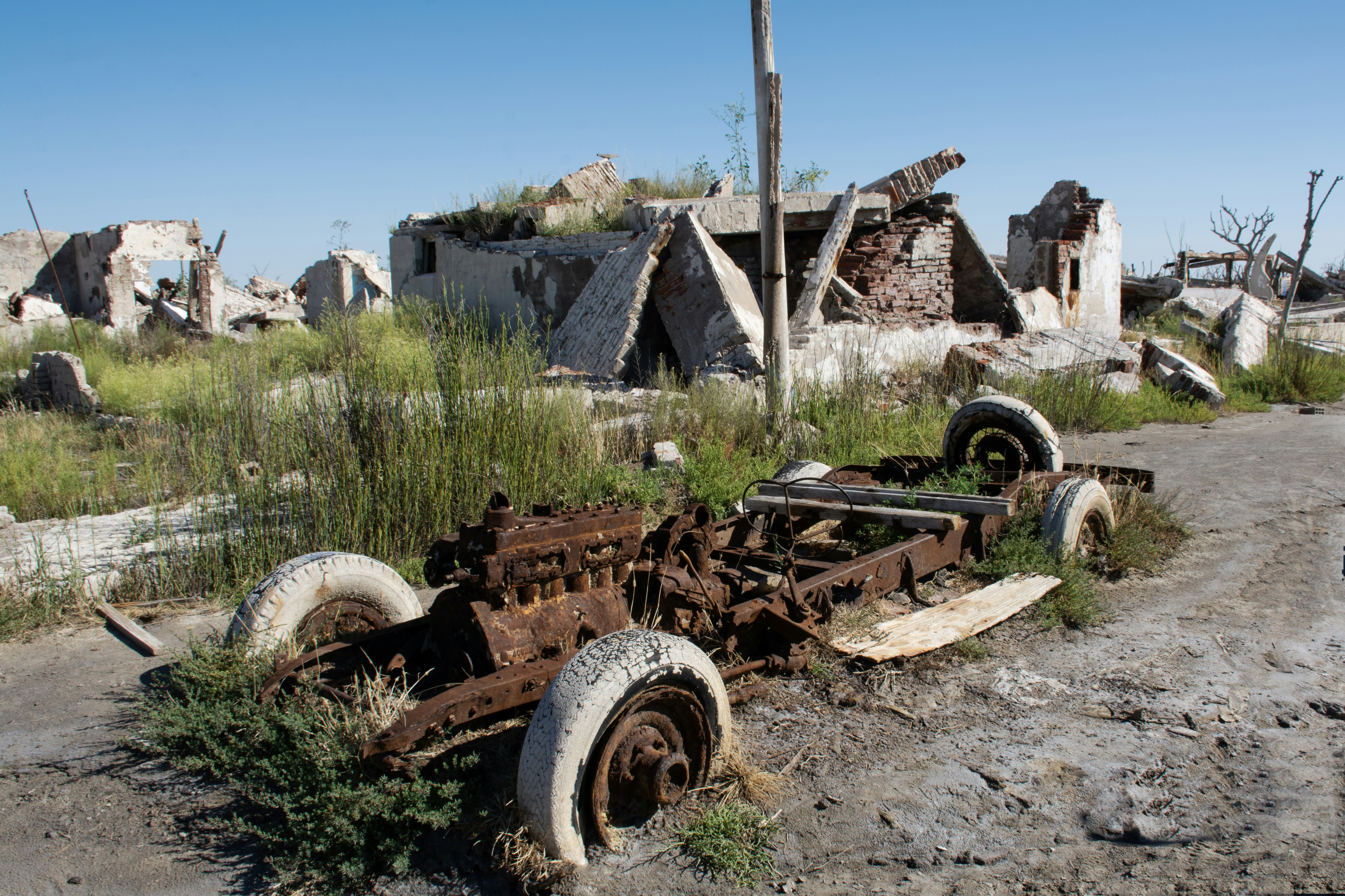 Rusting Chassis in a Deserted Lot