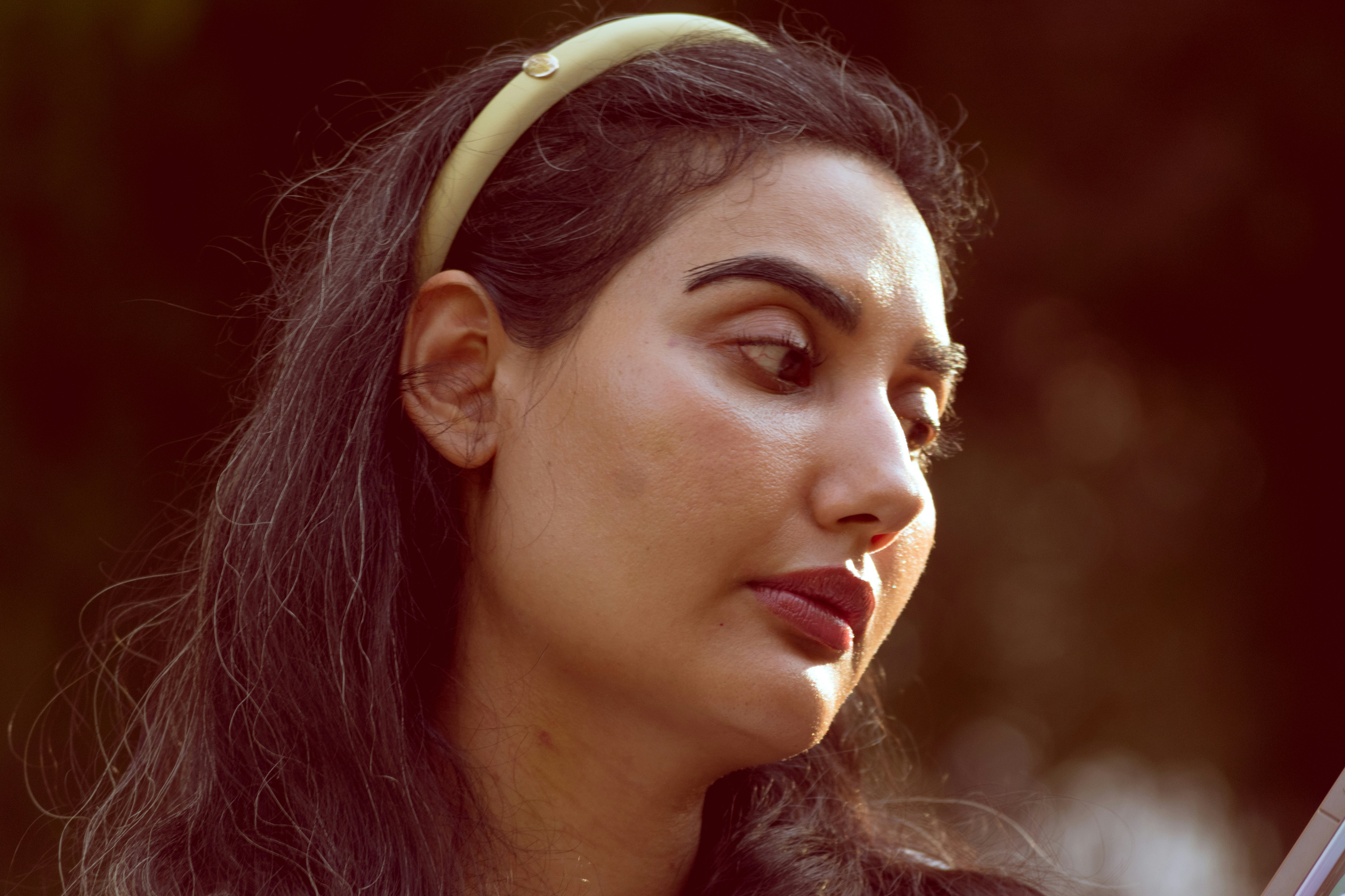 Portrait in Warm Evening Light: A Quiet Gaze